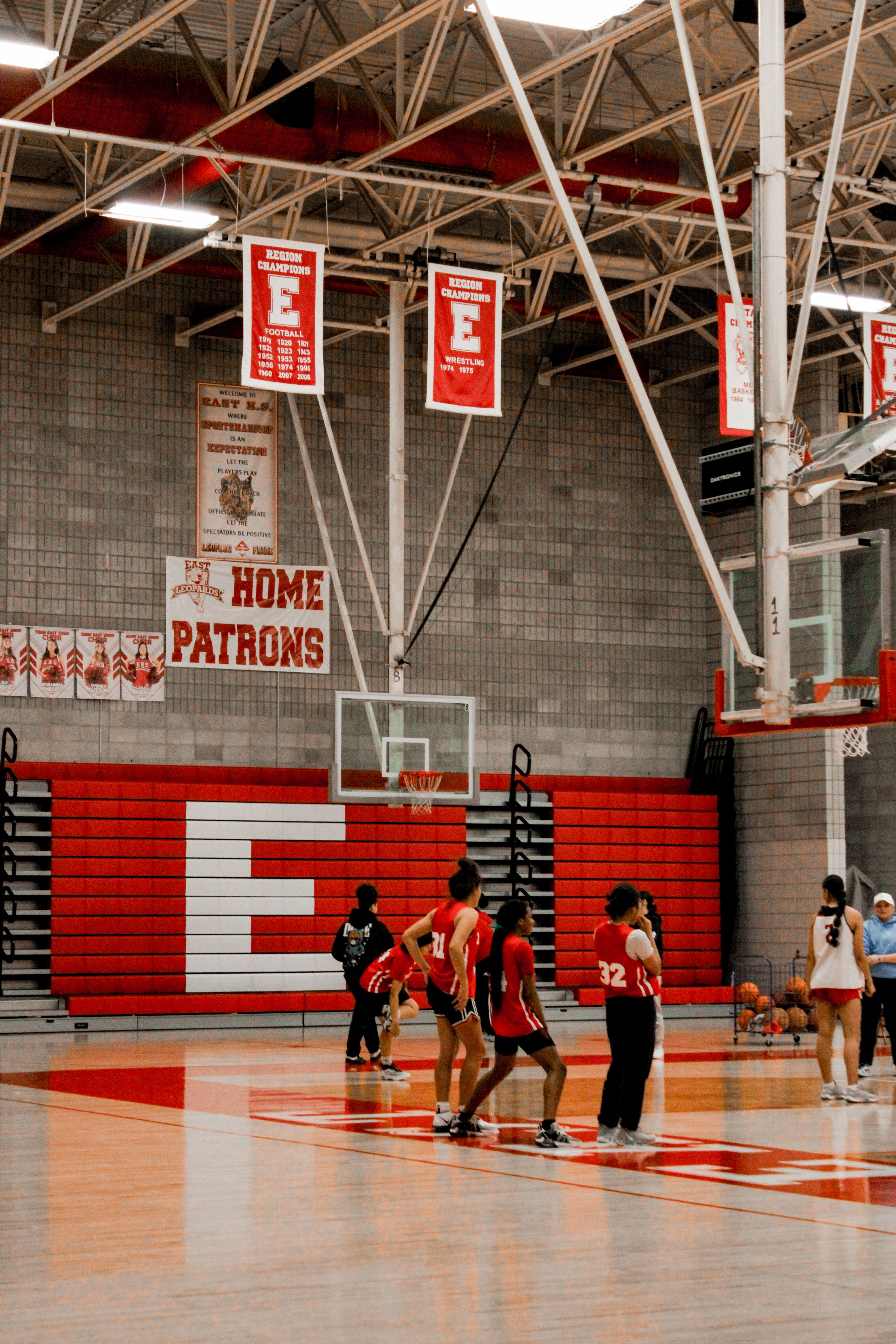 Free High School Basketball Practice in Gymnasium Stock Photo