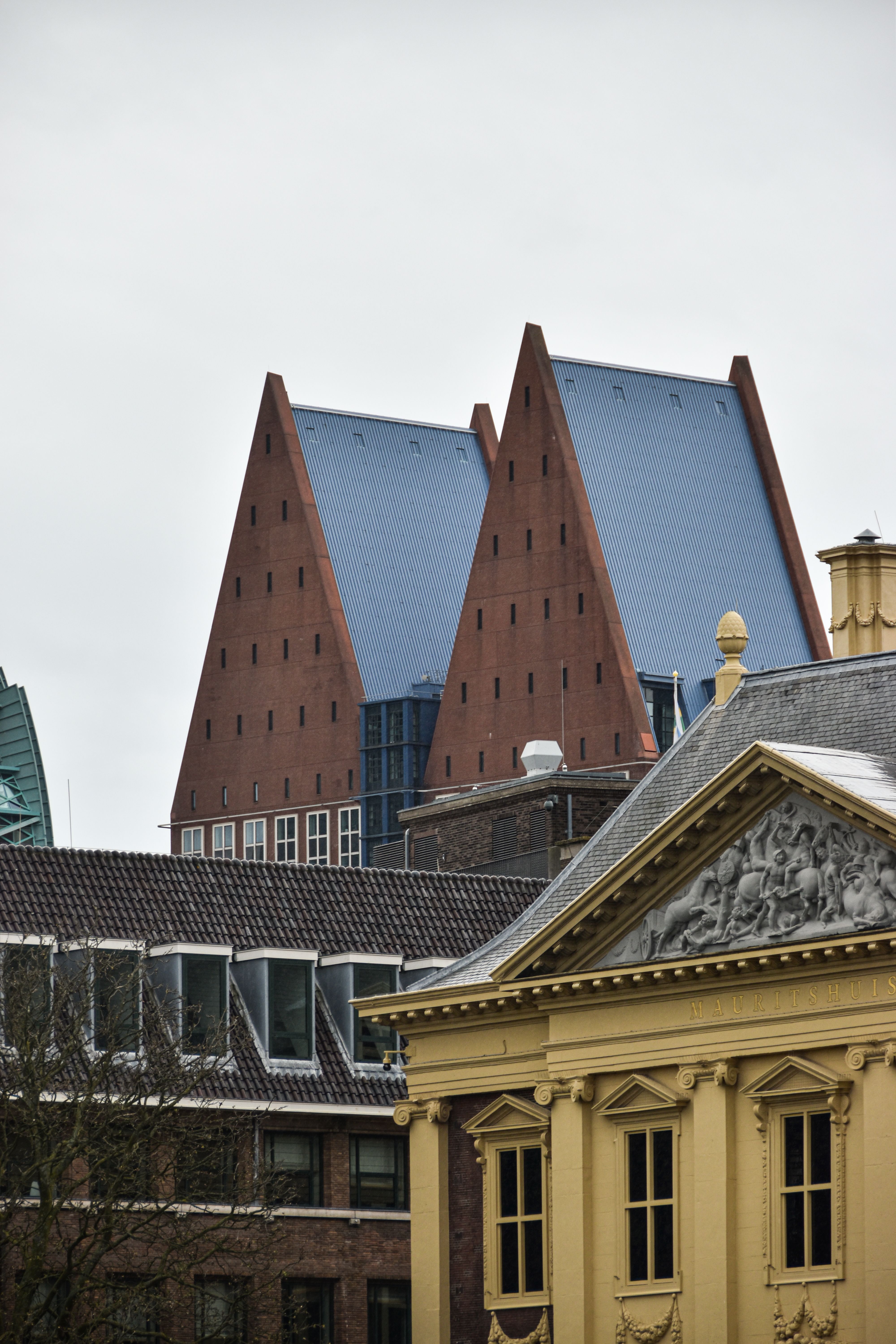Unique Architectural Rooftops in Urban Setting · Free Stock Photo
