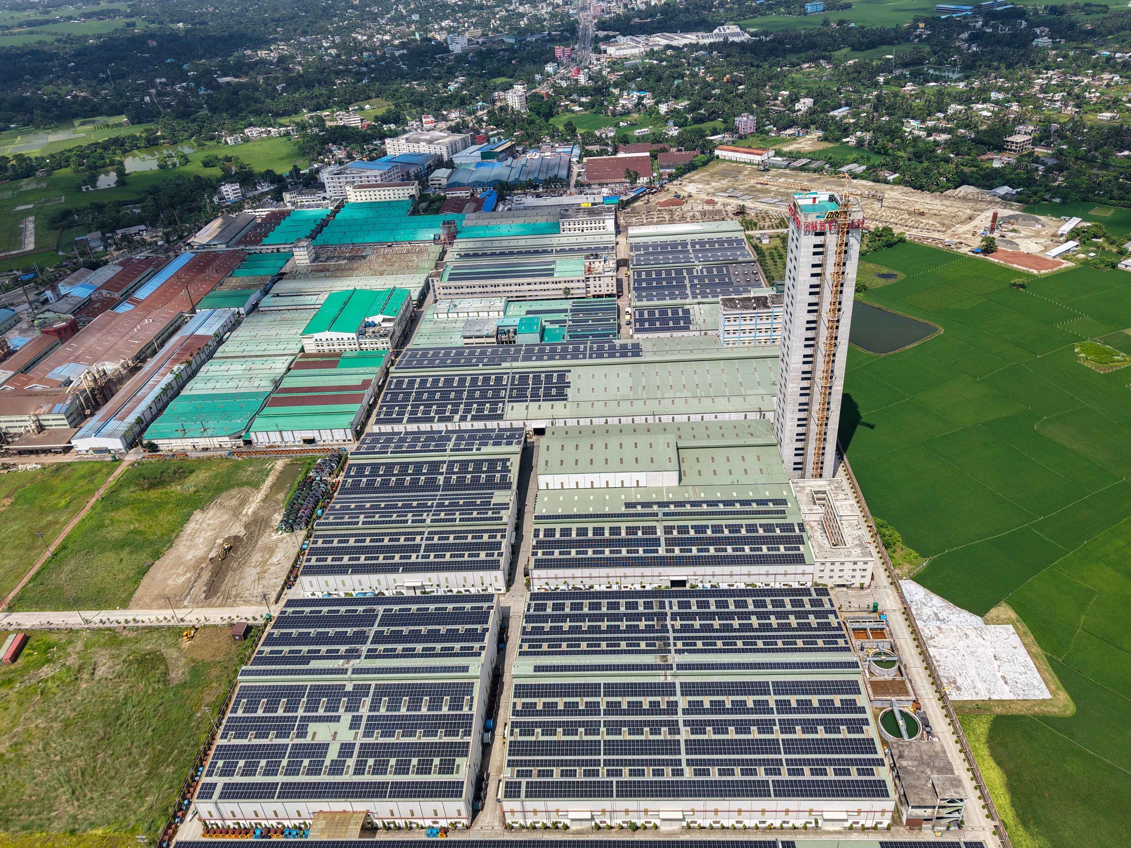 Aerial View of Large Industrial Complex with Solar Panels · Free Stock ...