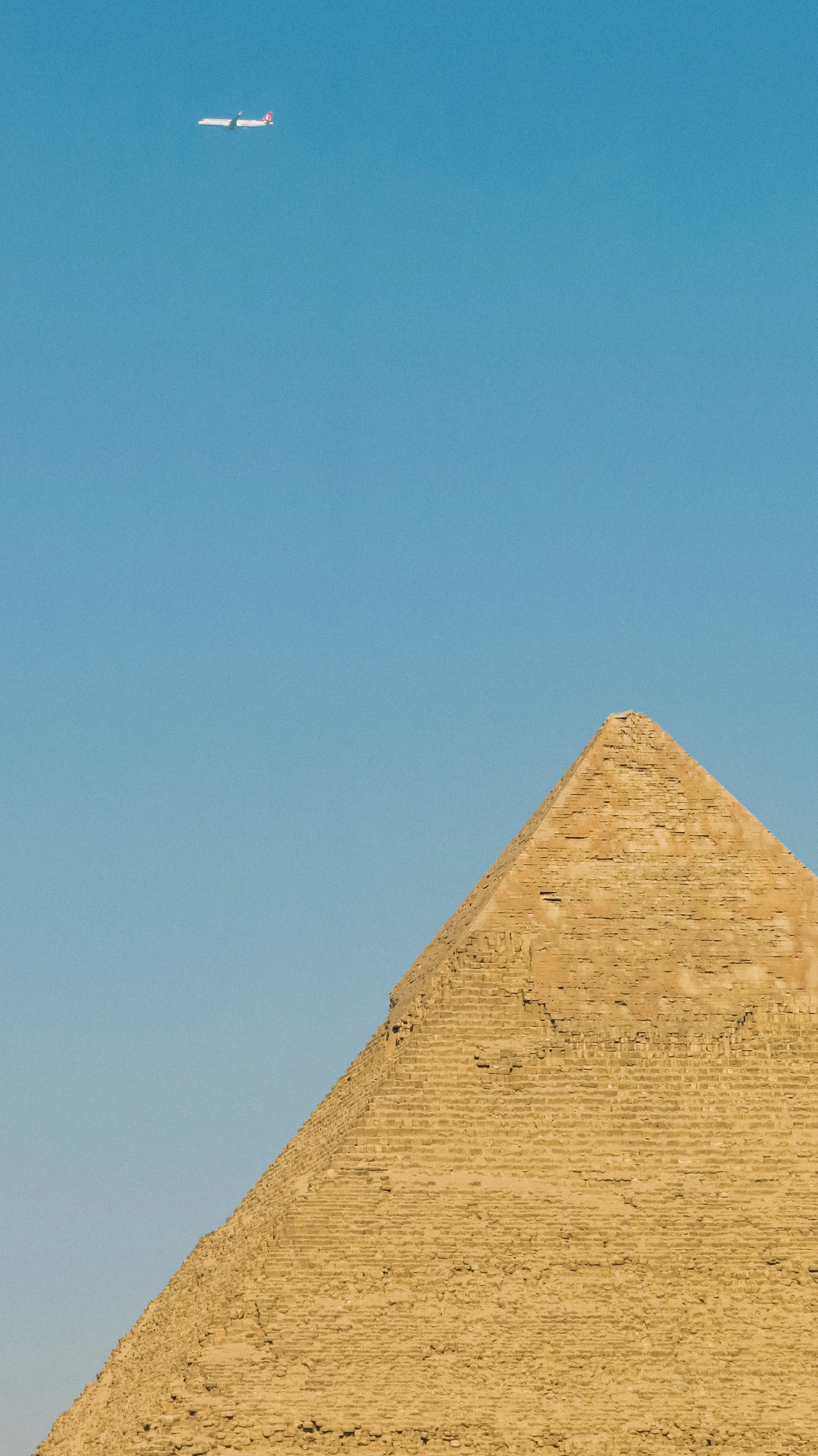 Airplane Over Giza Pyramid Under Clear Sky · Free Stock Photo