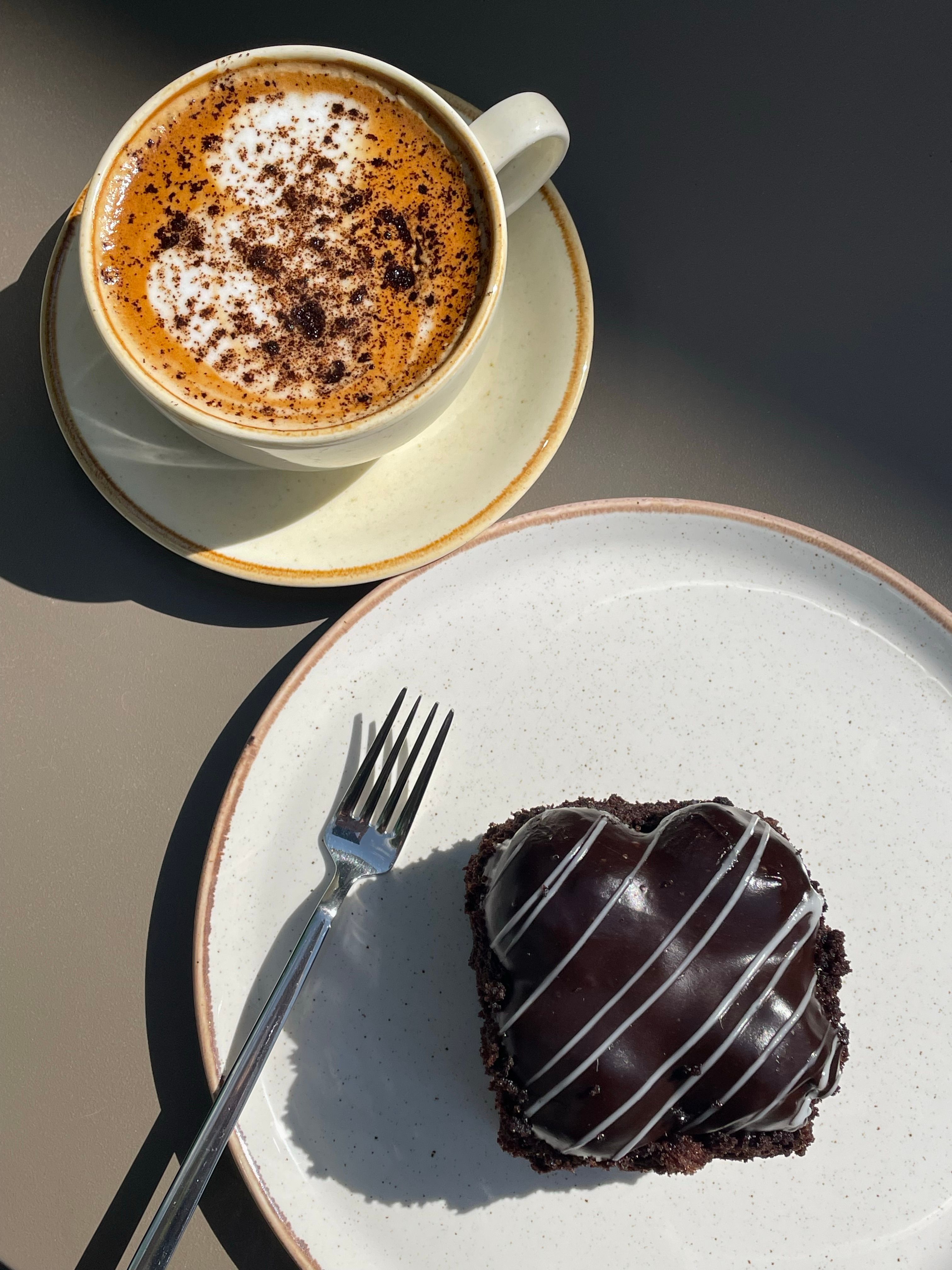 Cappuccino with Heart-Shaped Chocolate Pastry · Free Stock Photo