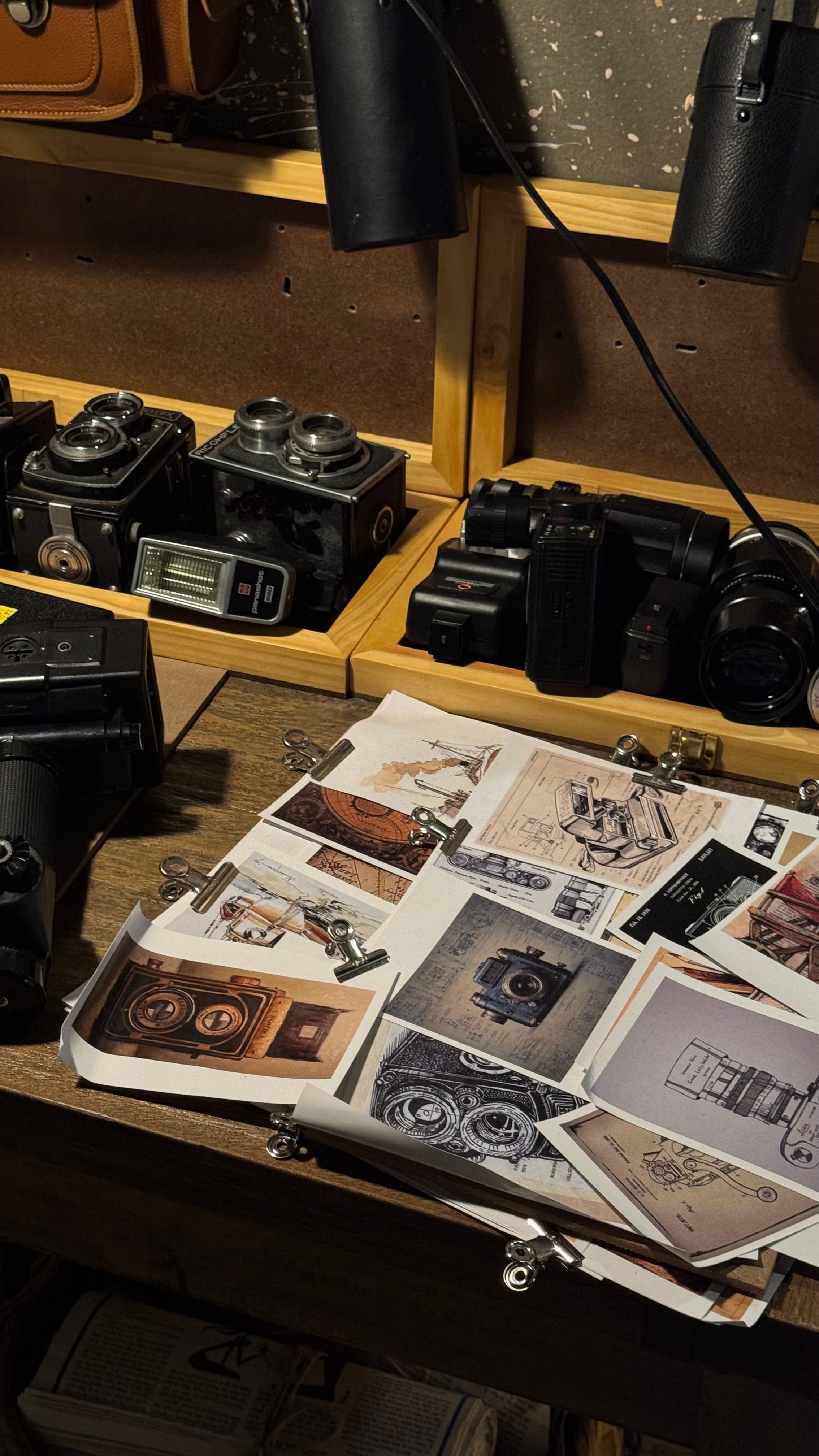 Vintage Cameras and Photography Prints Collection · Free Stock Photo