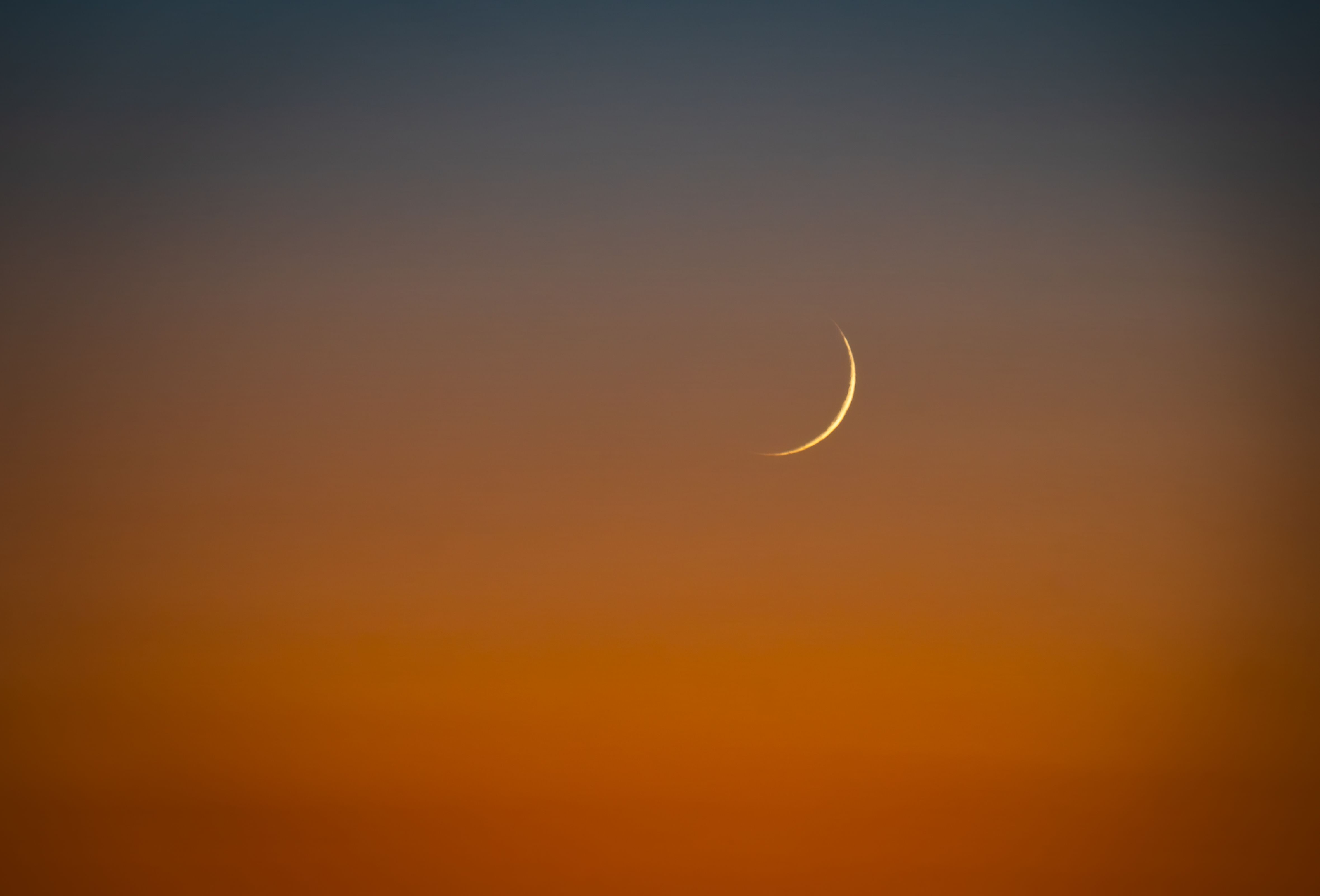 Crescent Moon Over Vibrant Sunset Sky · Free Stock Photo