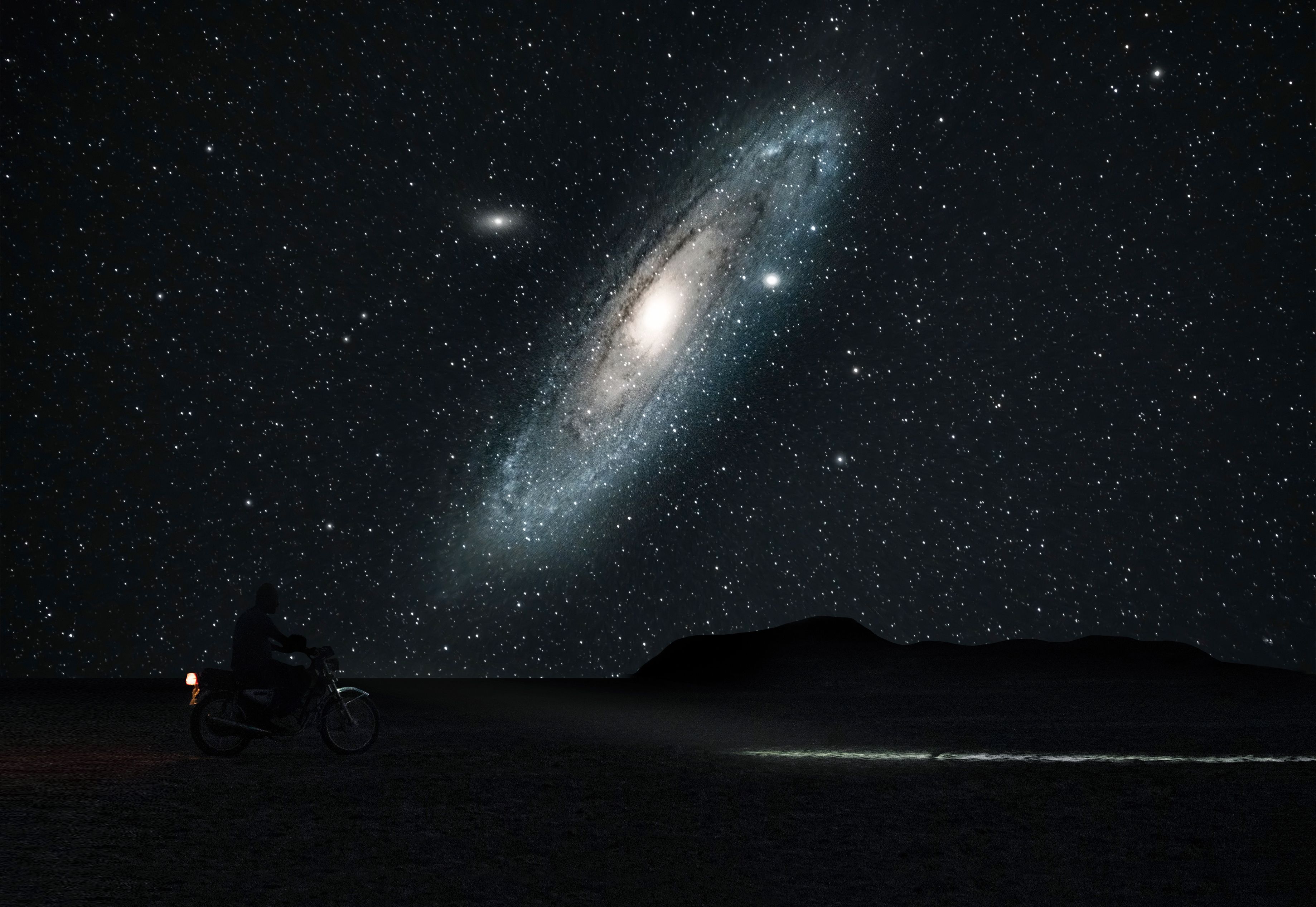 Motorcycle under Andromeda Galaxy Night Sky · Free Stock Photo