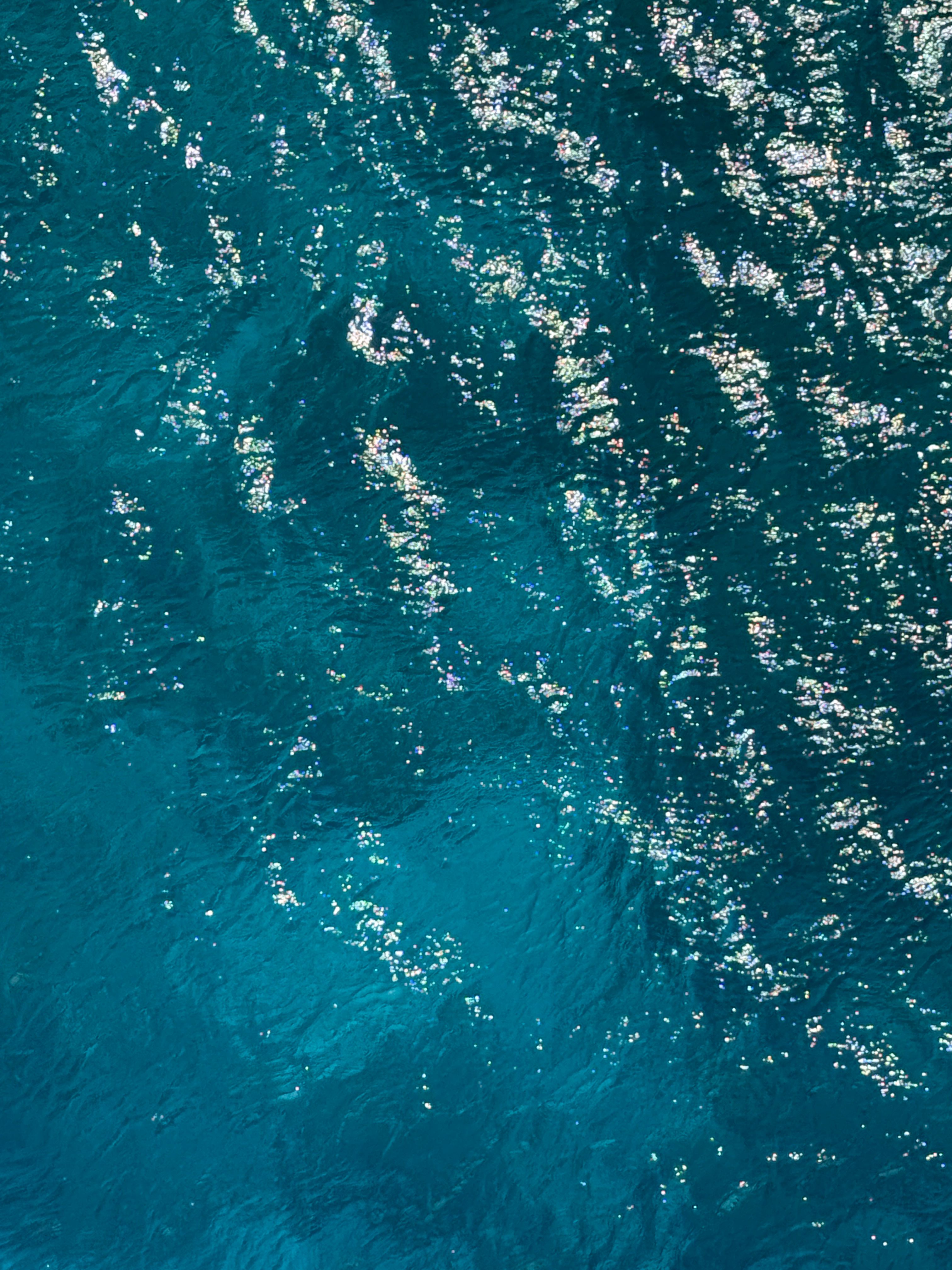 Close-up Photo of Blue Body of Water · Free Stock Photo