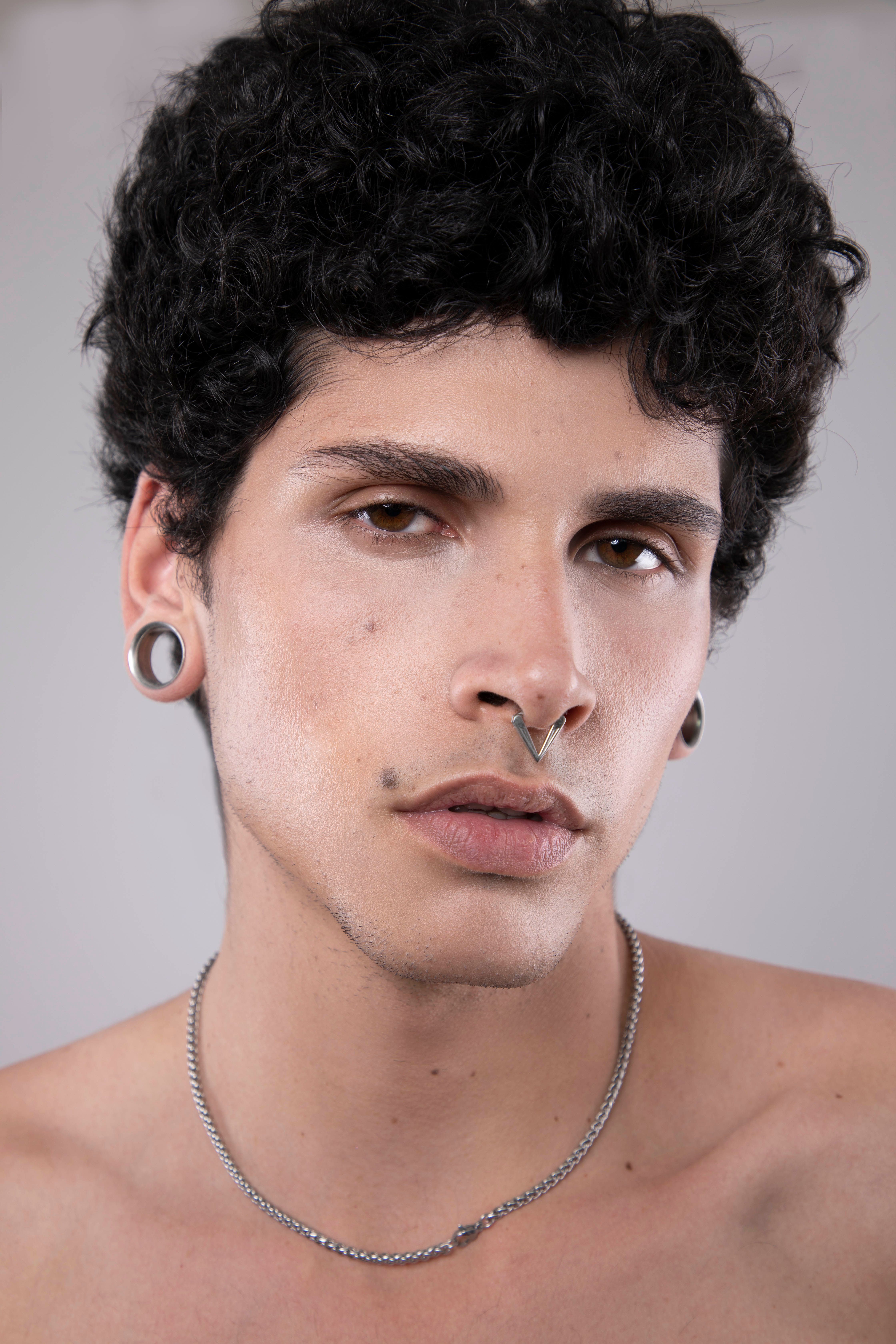 Modern Male Portrait with Piercings · Free Stock Photo