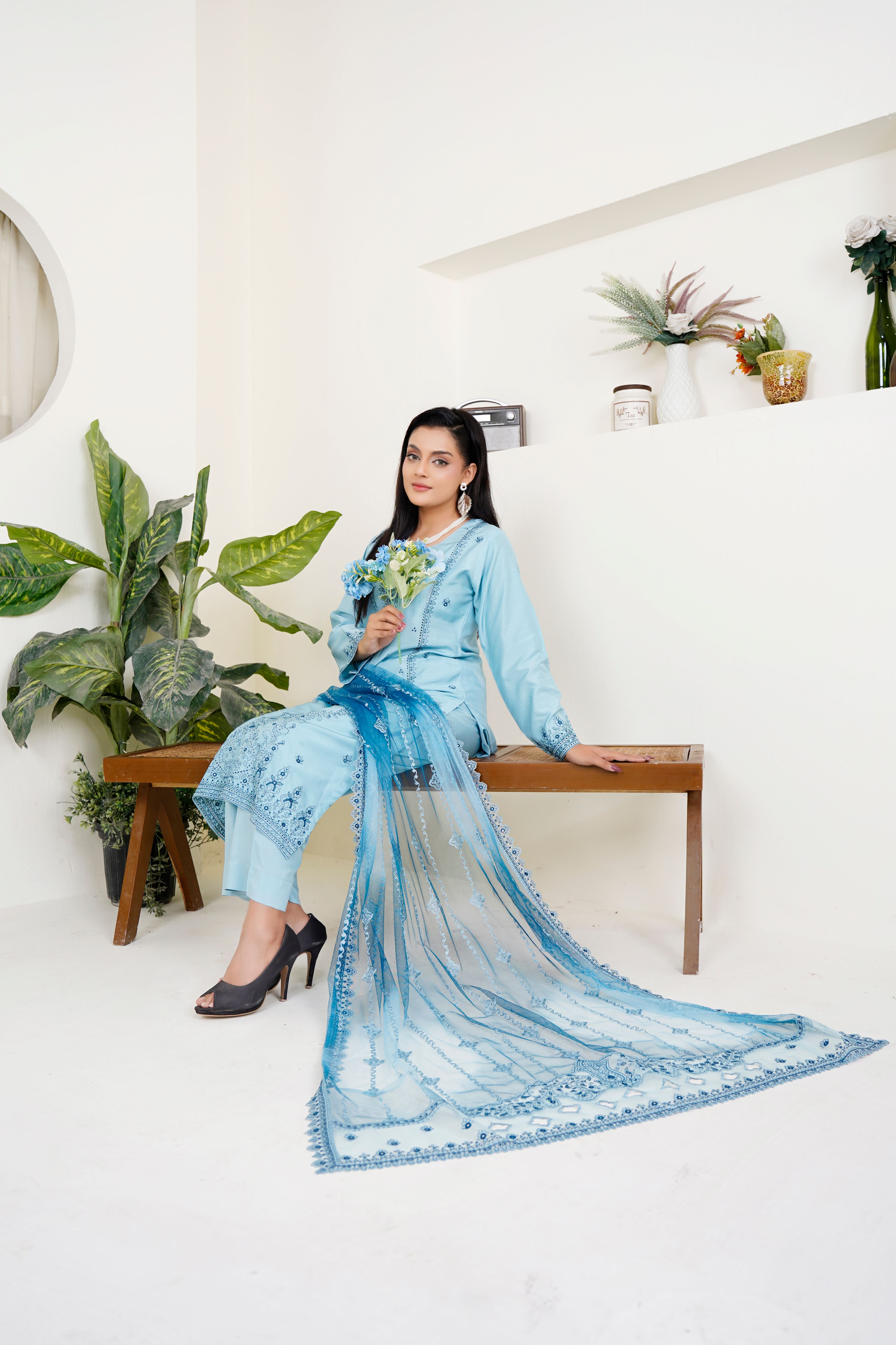 Elegant Woman in Blue Traditional Dress Indoors · Free Stock Photo