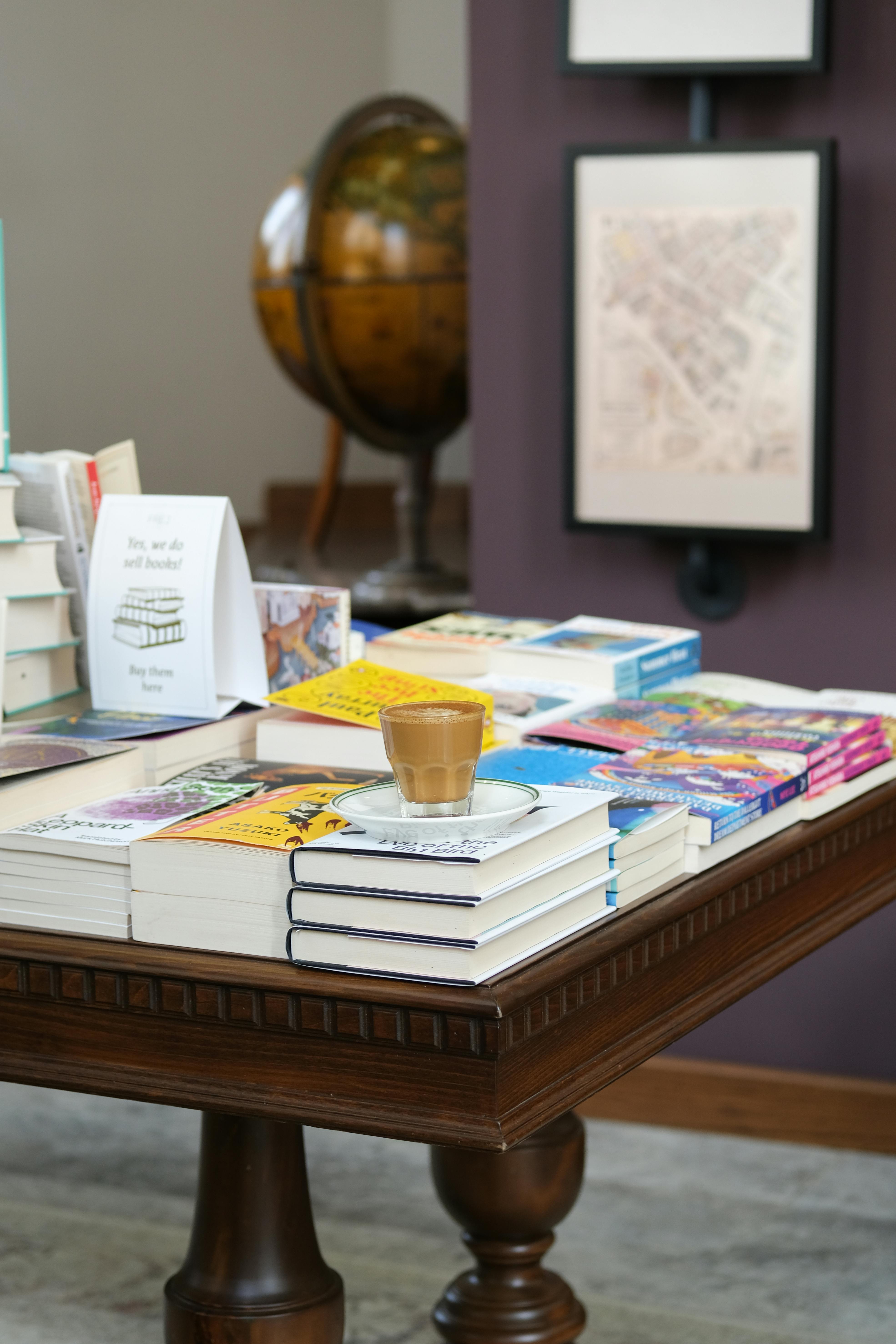 Cozy Bookstore Table with Coffee in Istanbul · Free Stock Photo