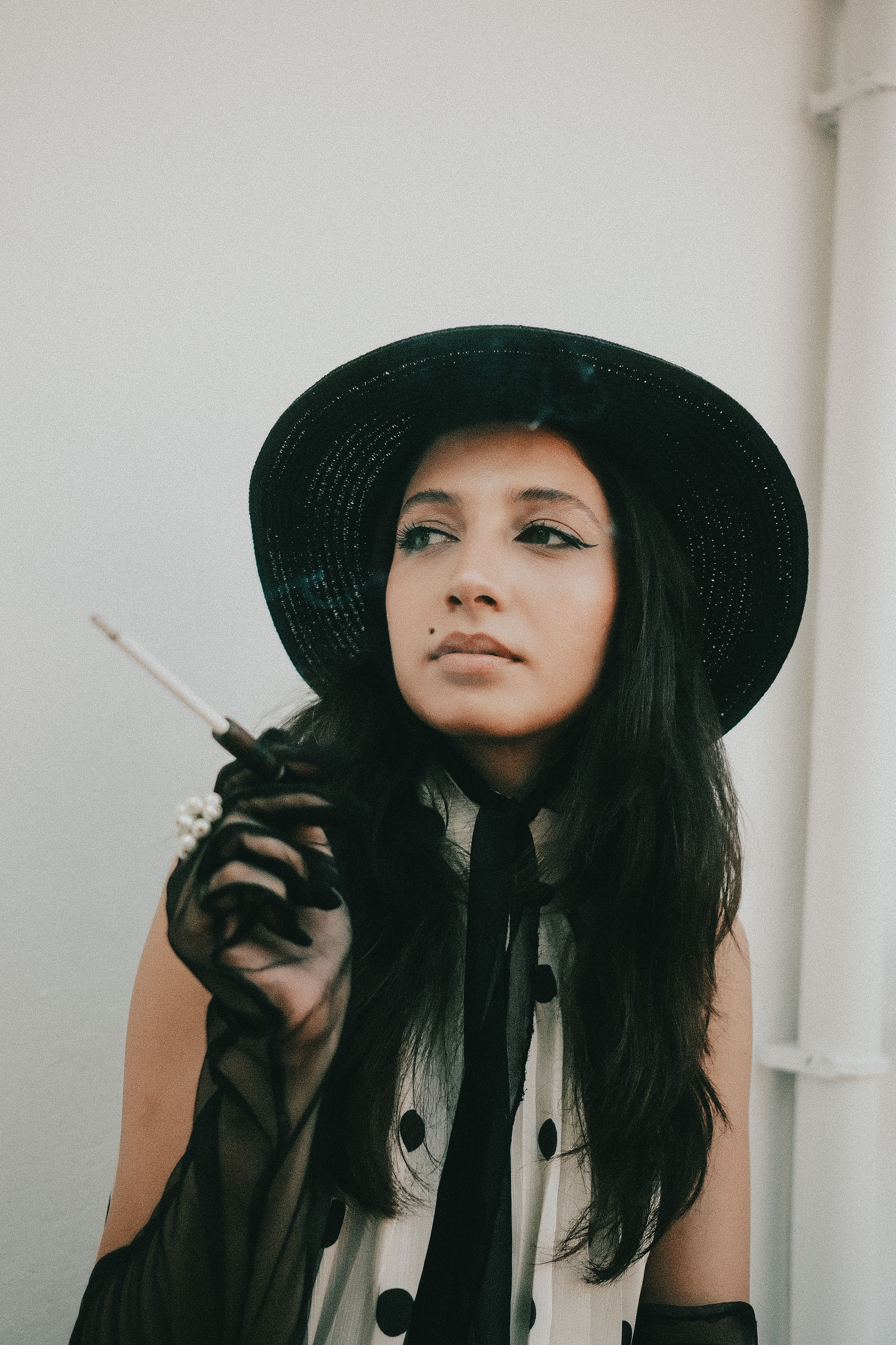A Curly Hair Woman Smoking Weed · Free Stock Photo