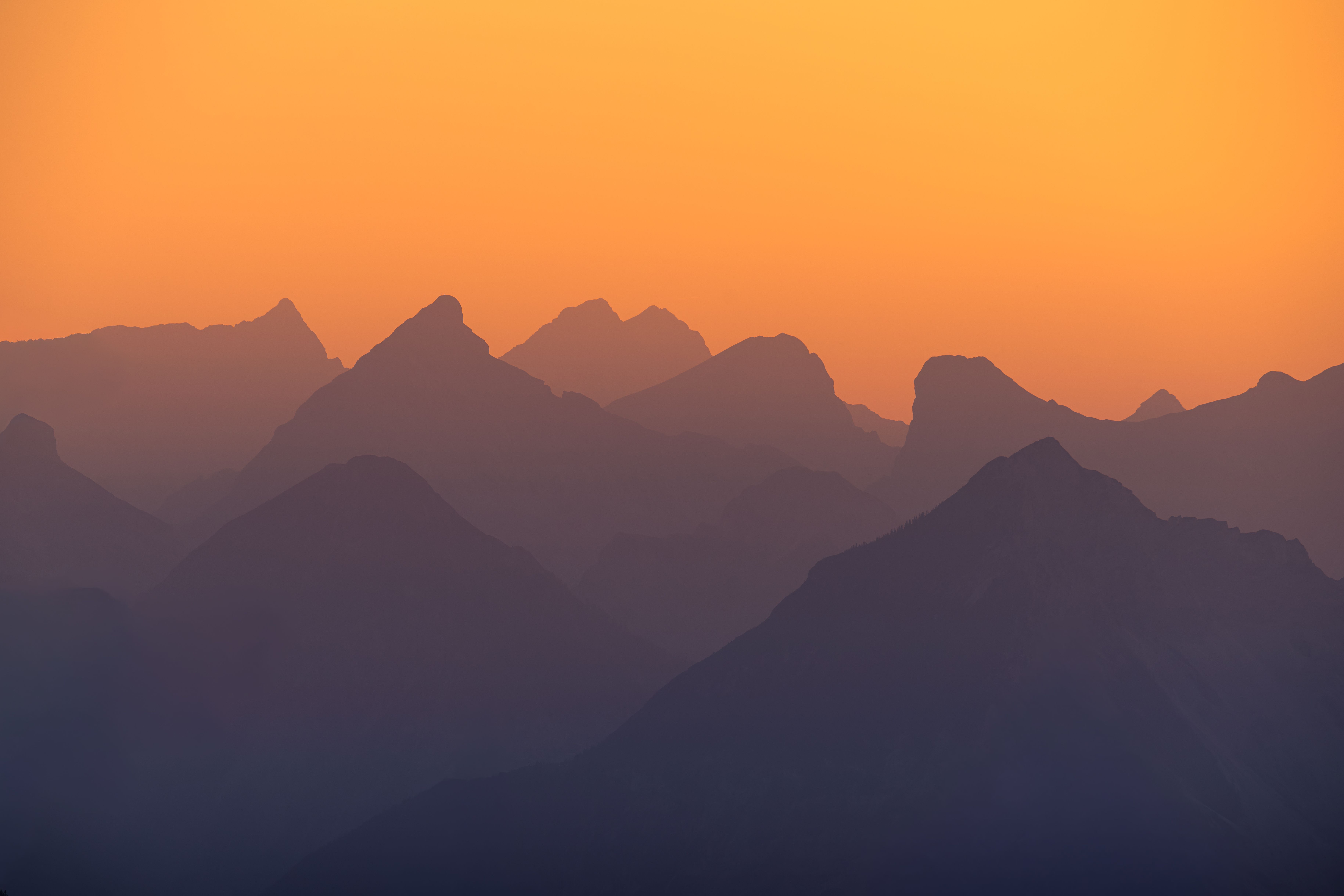 Sunset Over Austrian Alps Silhouettes · Free Stock Photo