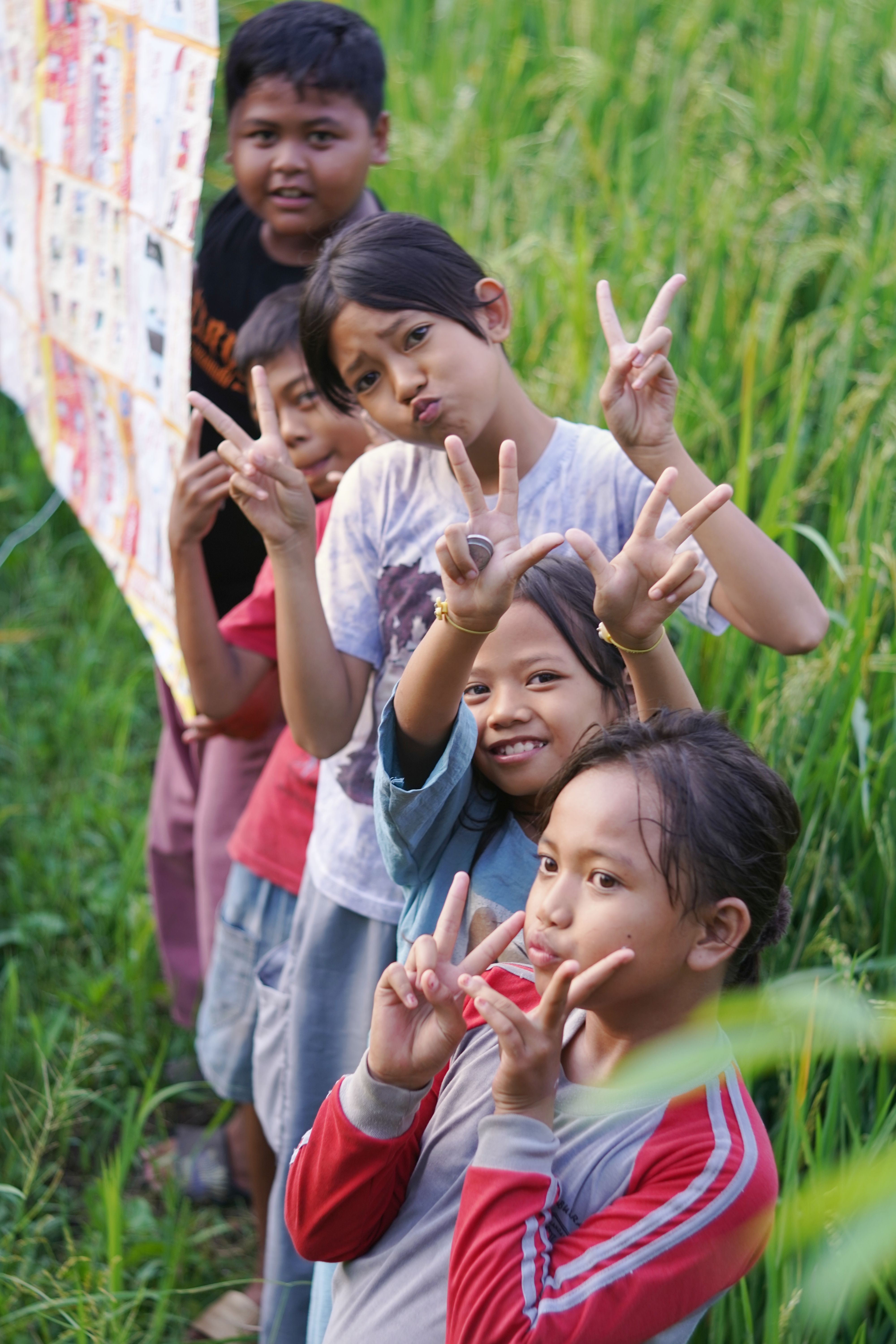 Joyful Children Playing in Paddy Fields · Free Stock Photo