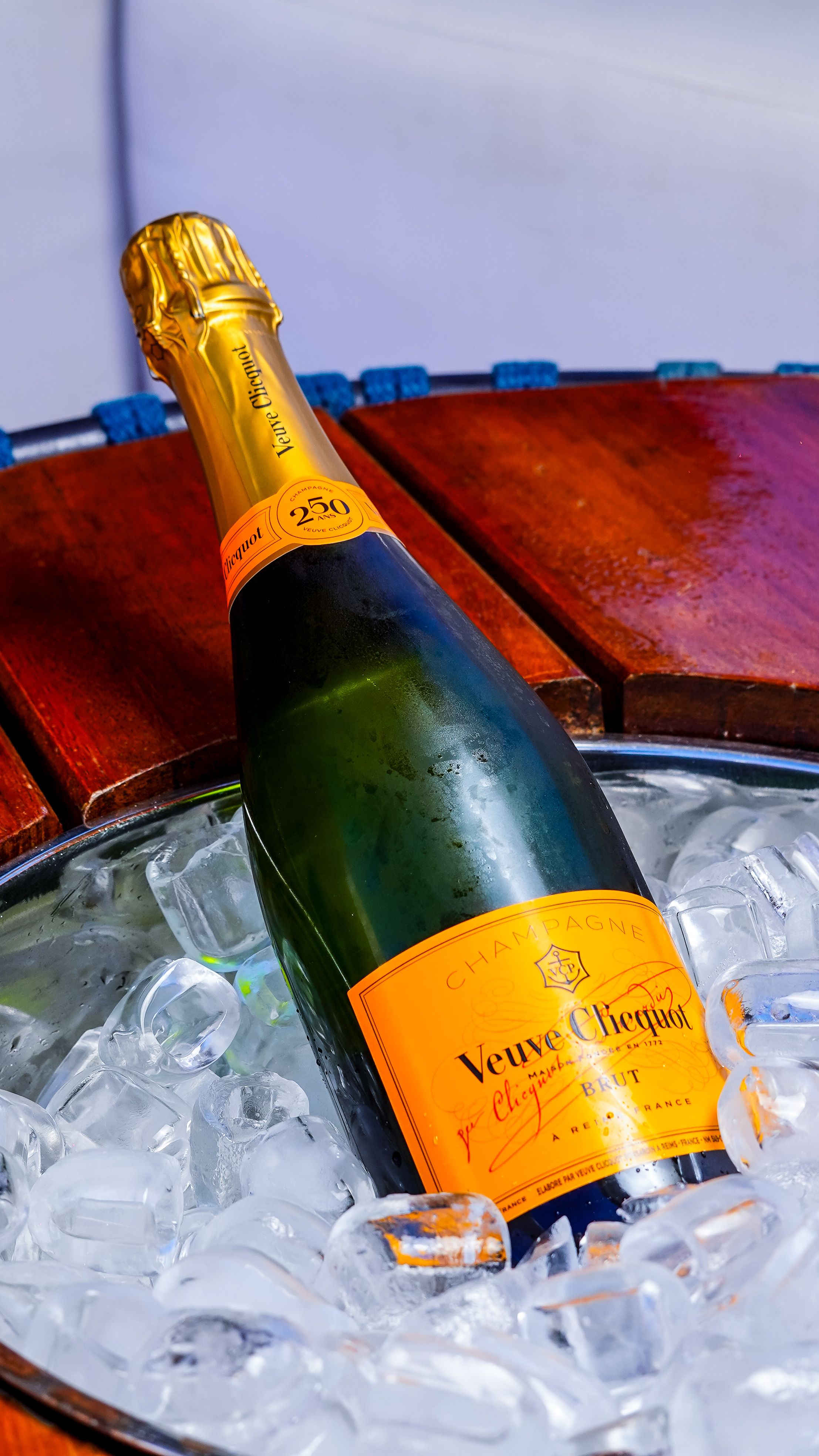 Chilled Champagne Bottle on Ice in Bucket · Free Stock Photo