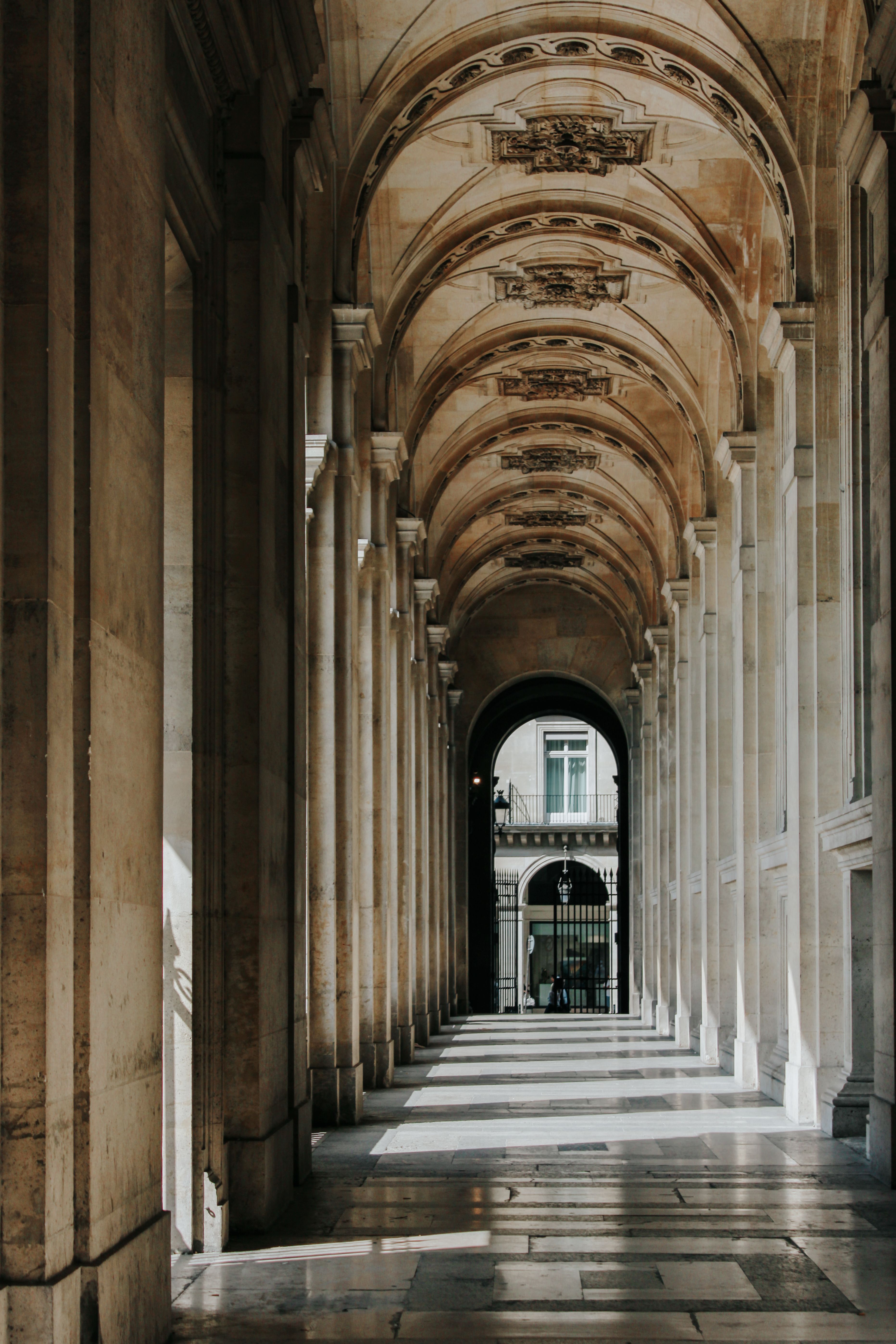 Arched Pathway Inside the Louvre Museum in Paris, France · Free Stock Photo