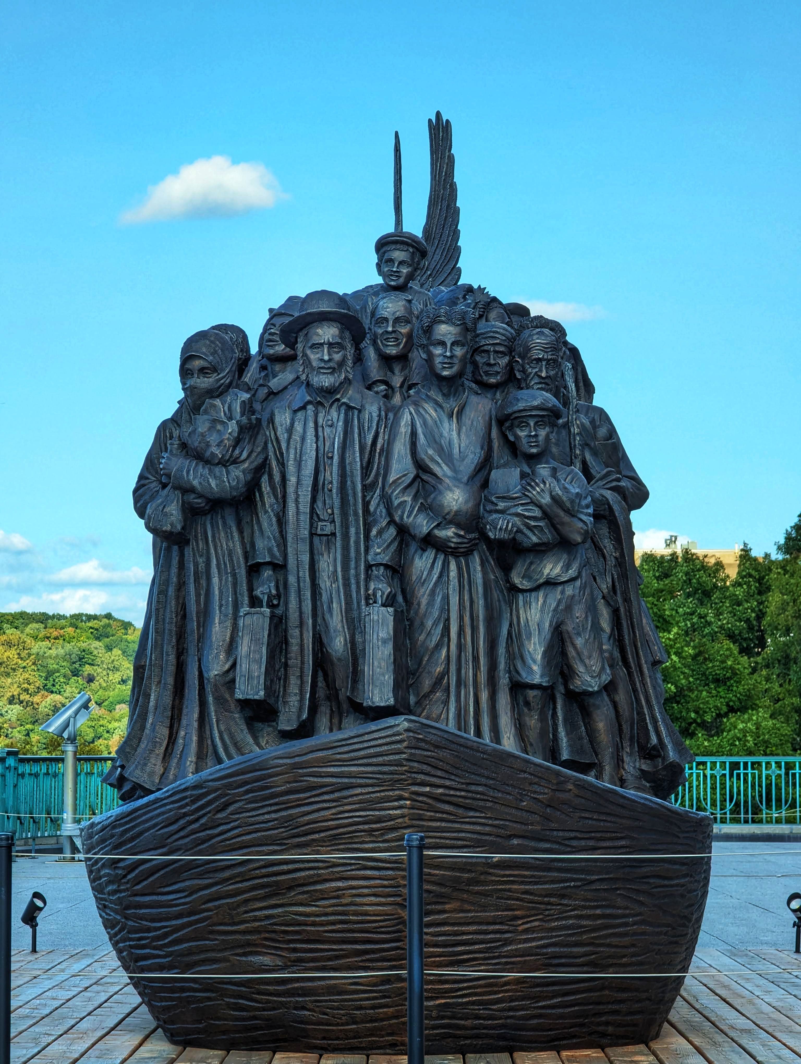 Diverse Immigrant Statue in Outdoor Setting · Free Stock Photo