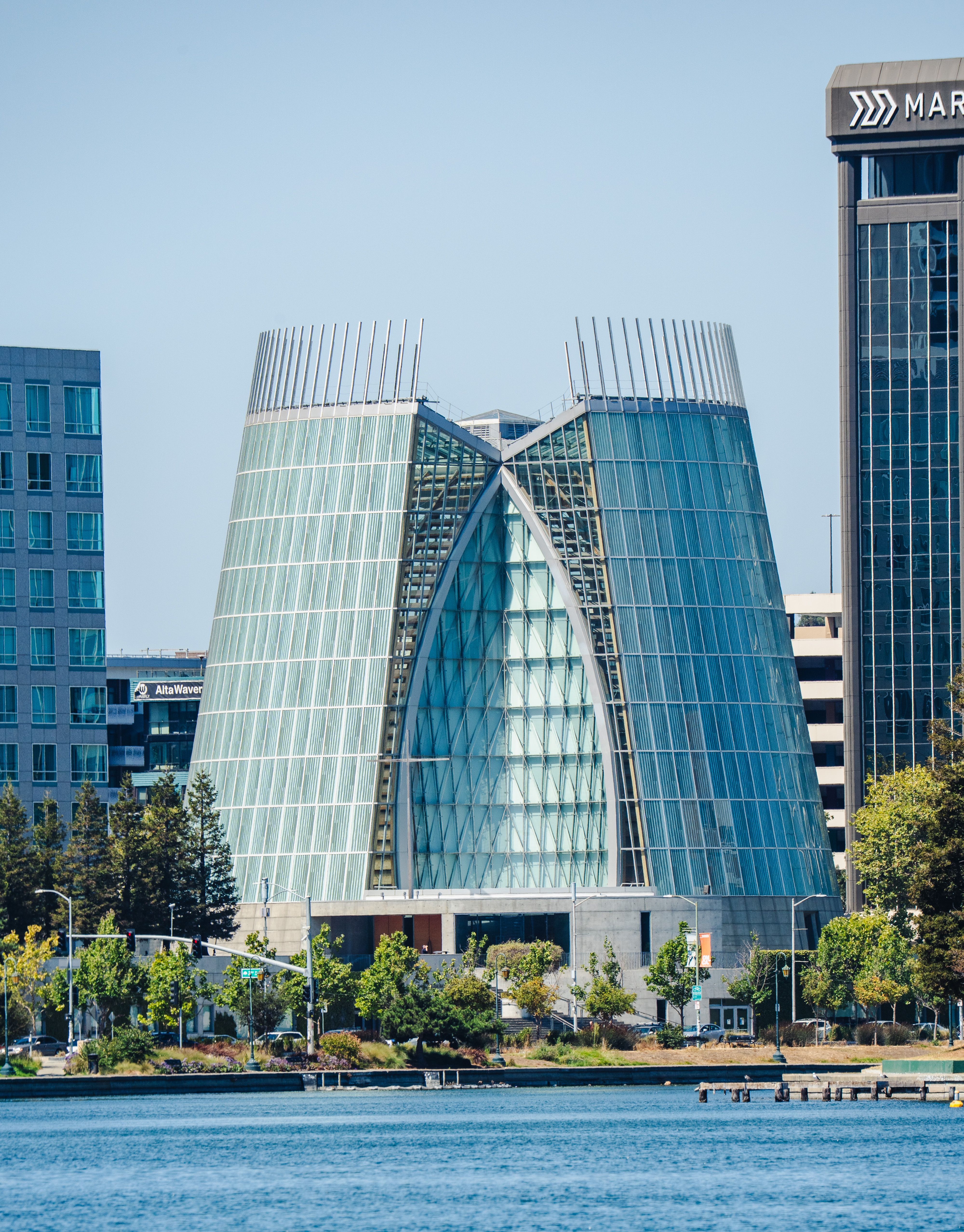 Modern Cathedral Building by Waterfront · Free Stock Photo