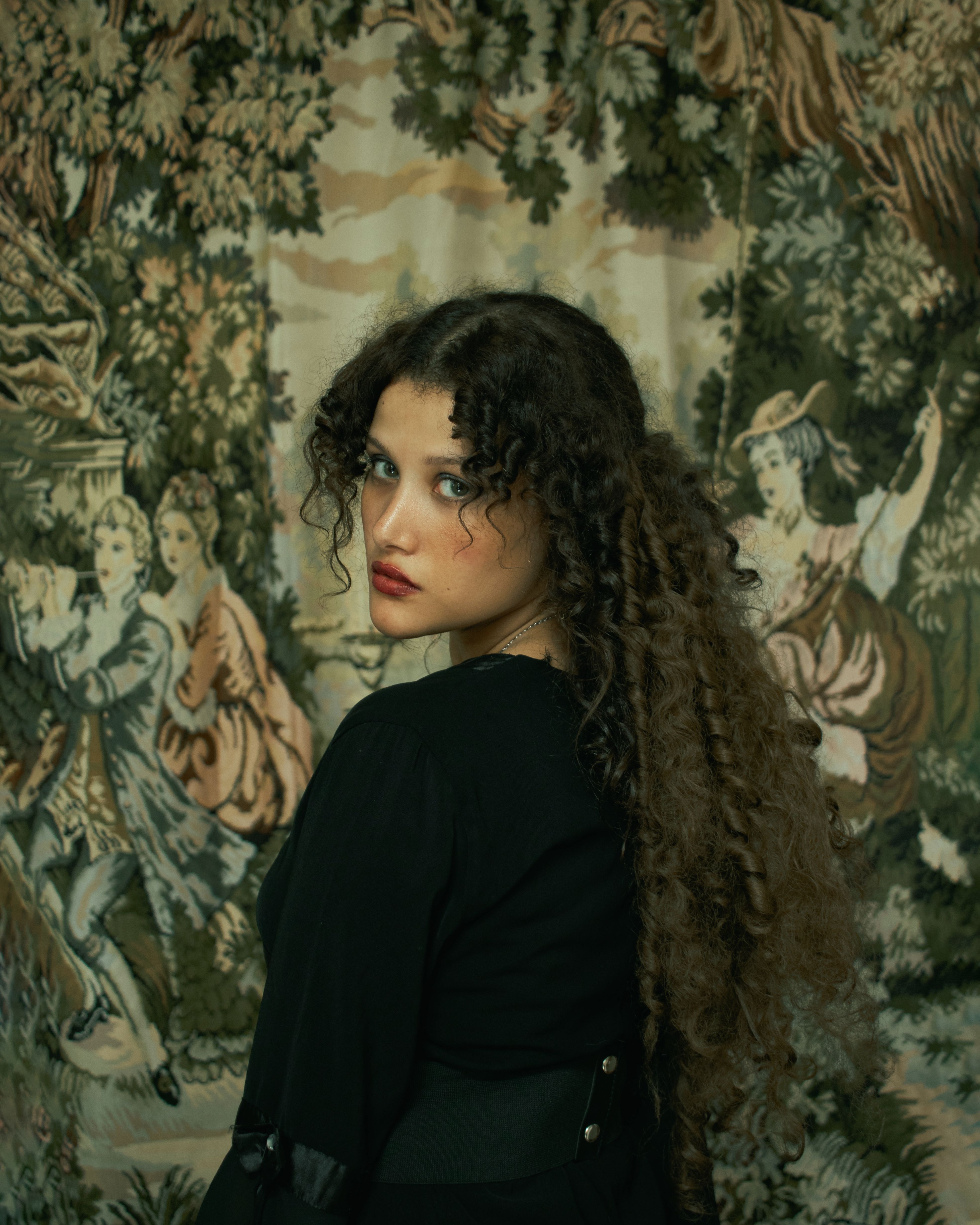 Portrait of Woman with Tapestry Background · Free Stock Photo