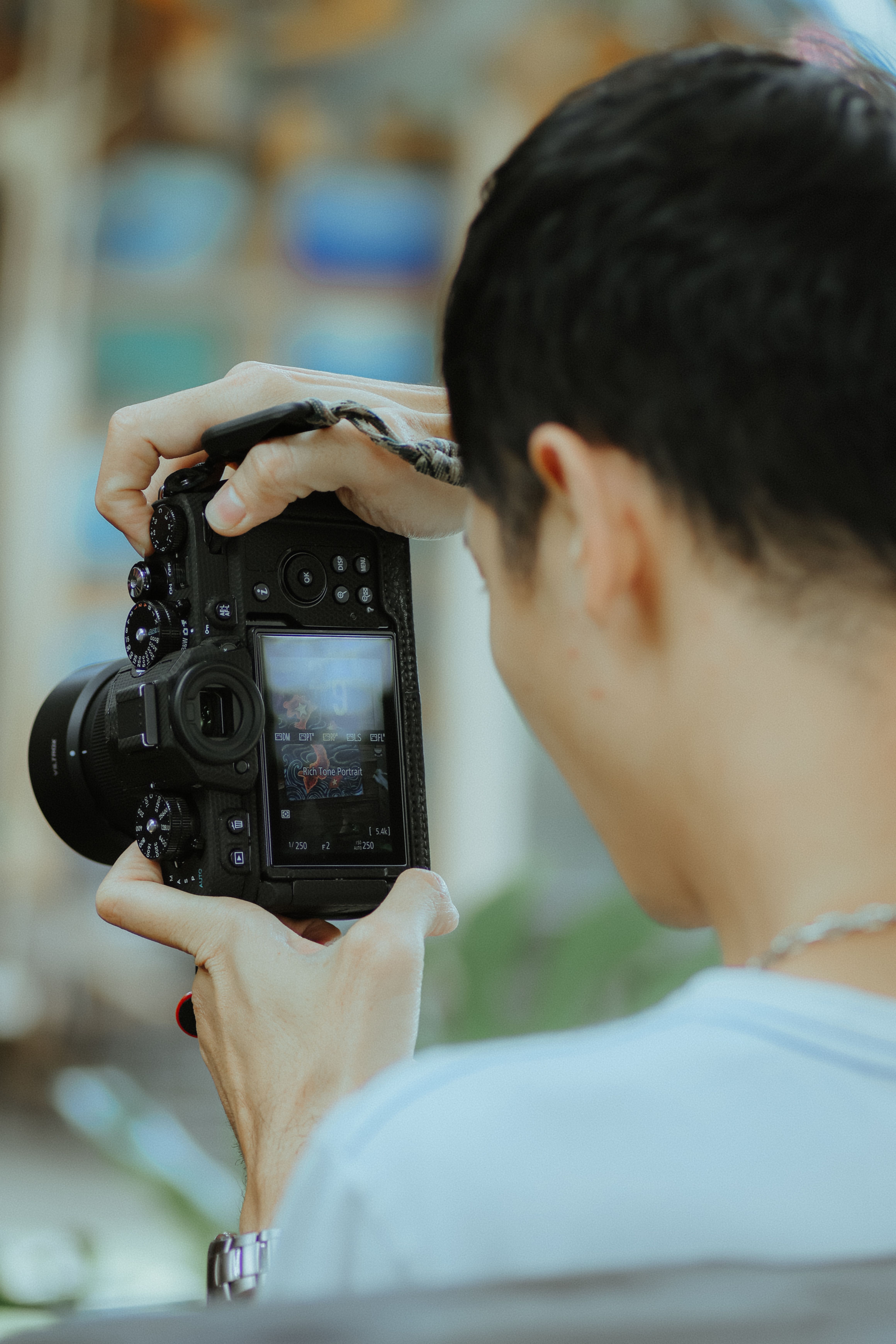 Photographer Capturing Scenic Shot with DSLR · Free Stock Photo