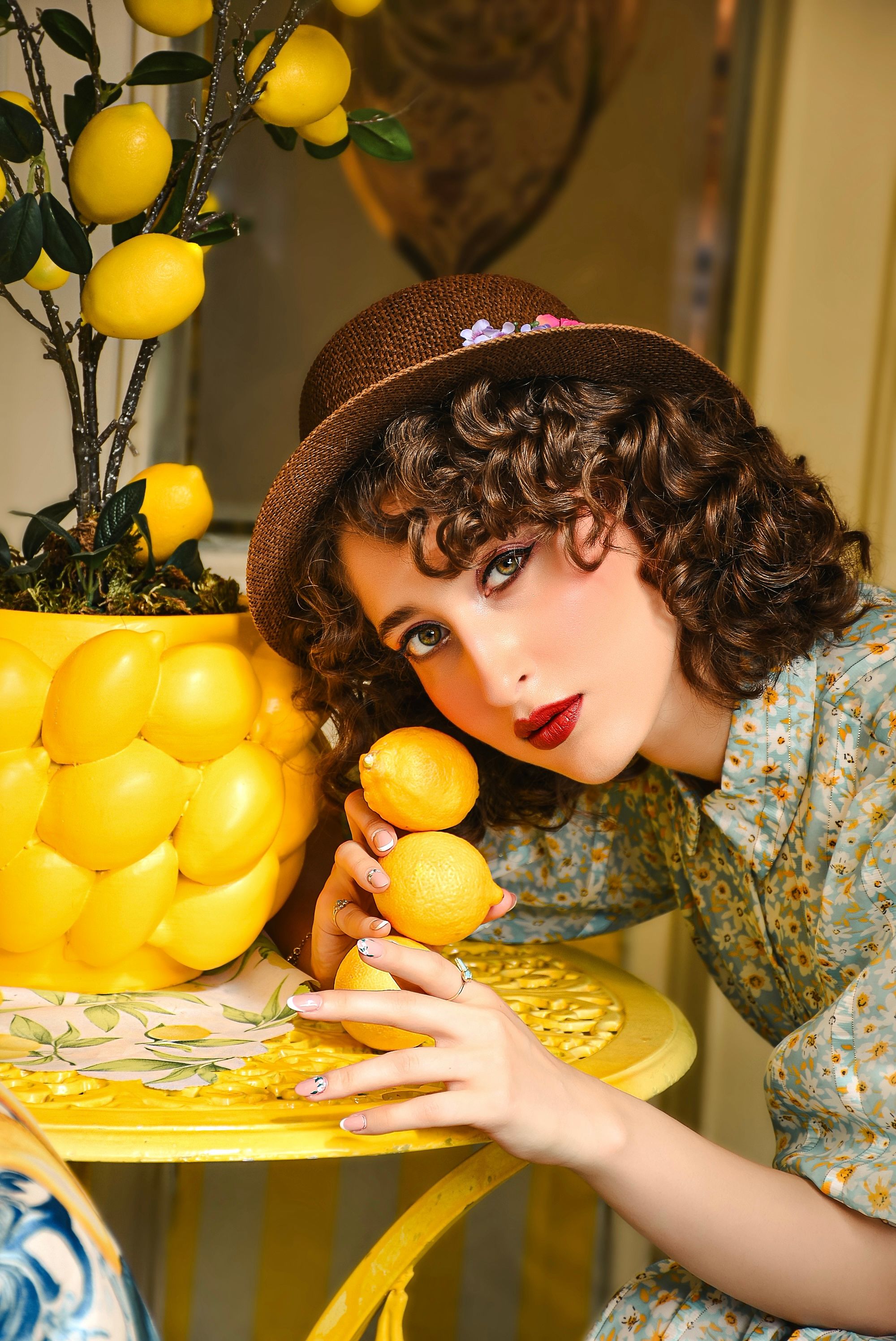 Vintage Style Woman Posing with Lemons · Free Stock Photo