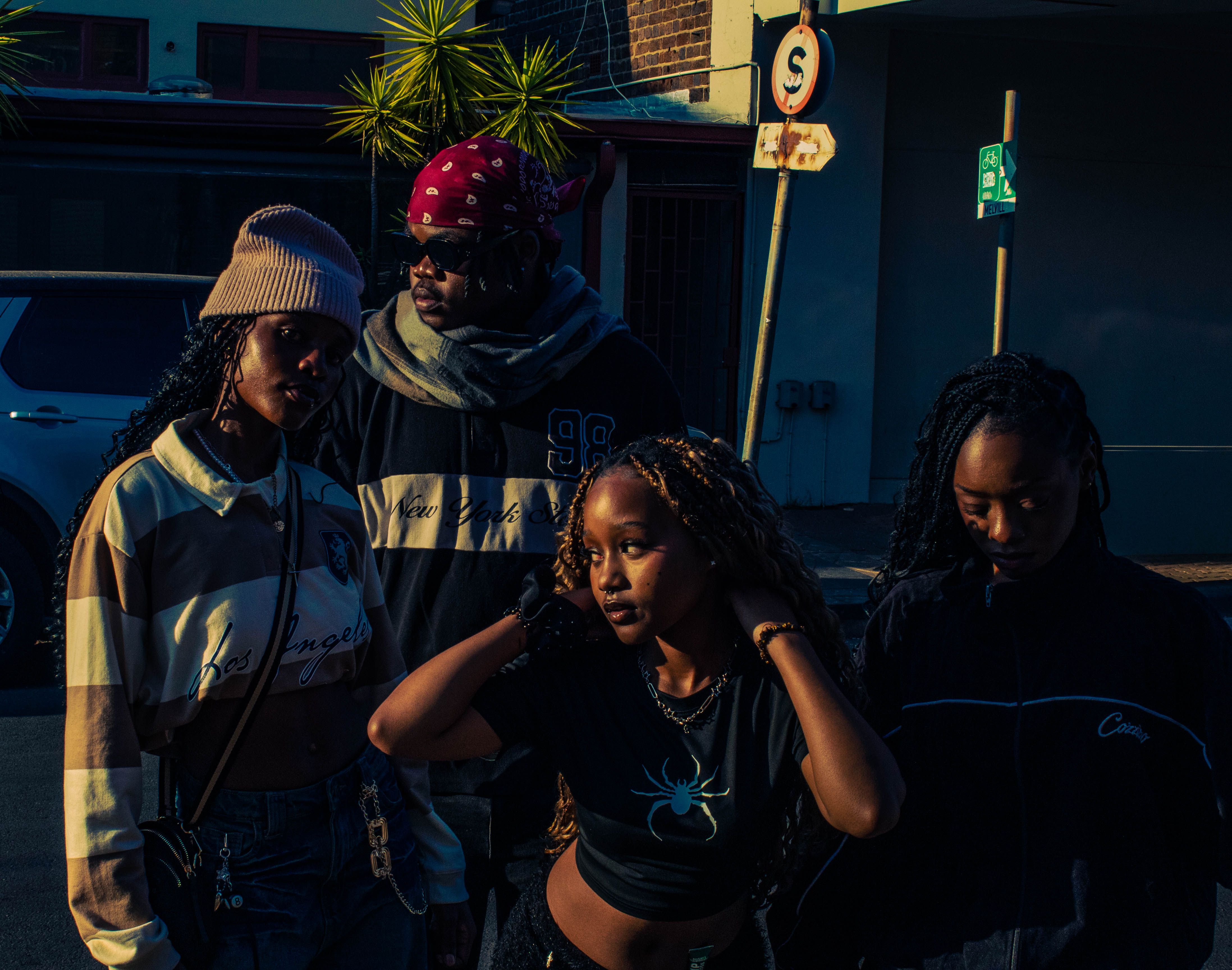 Street Fashion Group Posing in Urban Area · Free Stock Photo