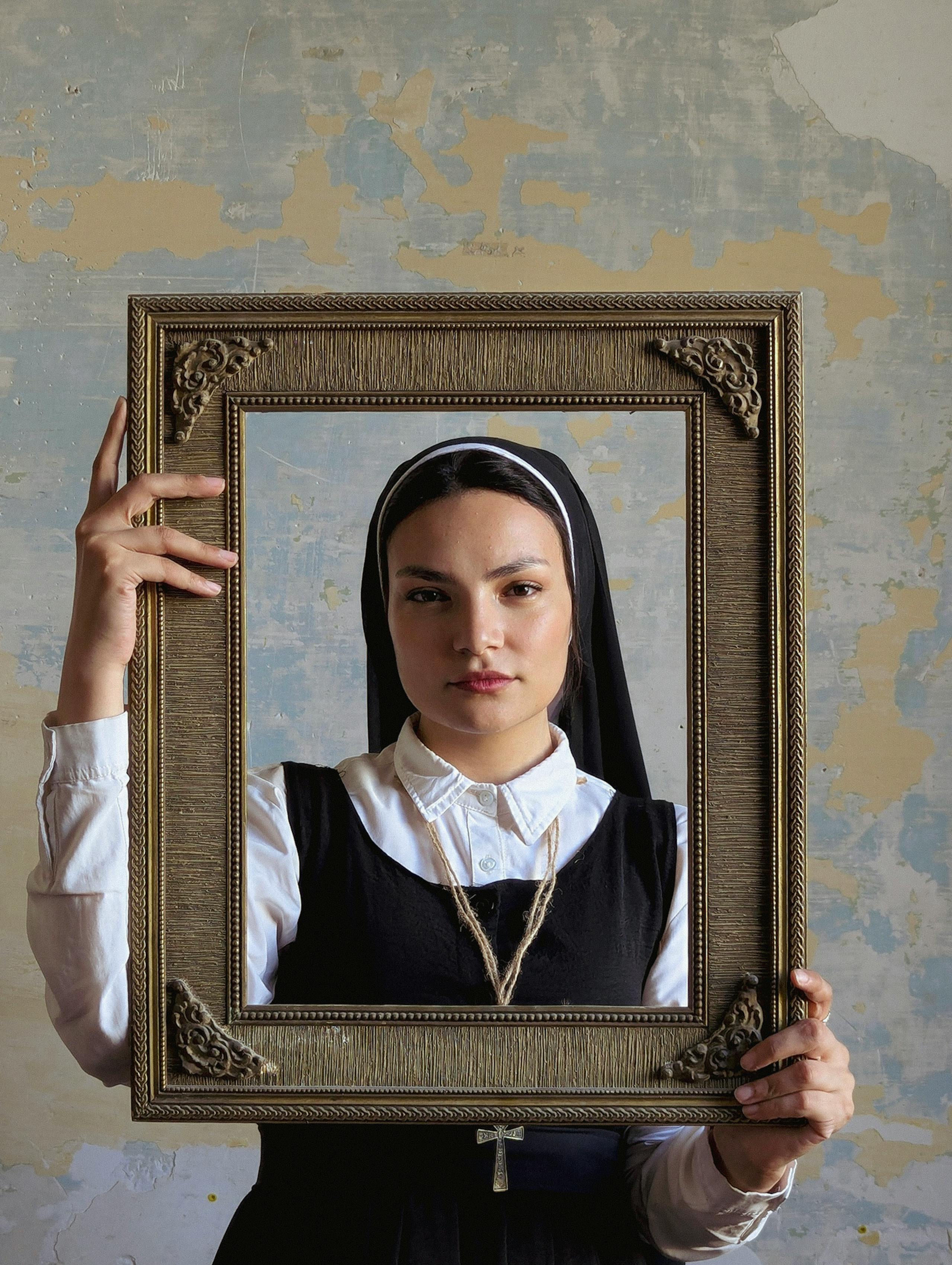 Young Woman Posing with Ornate Picture Frame · Free Stock Photo