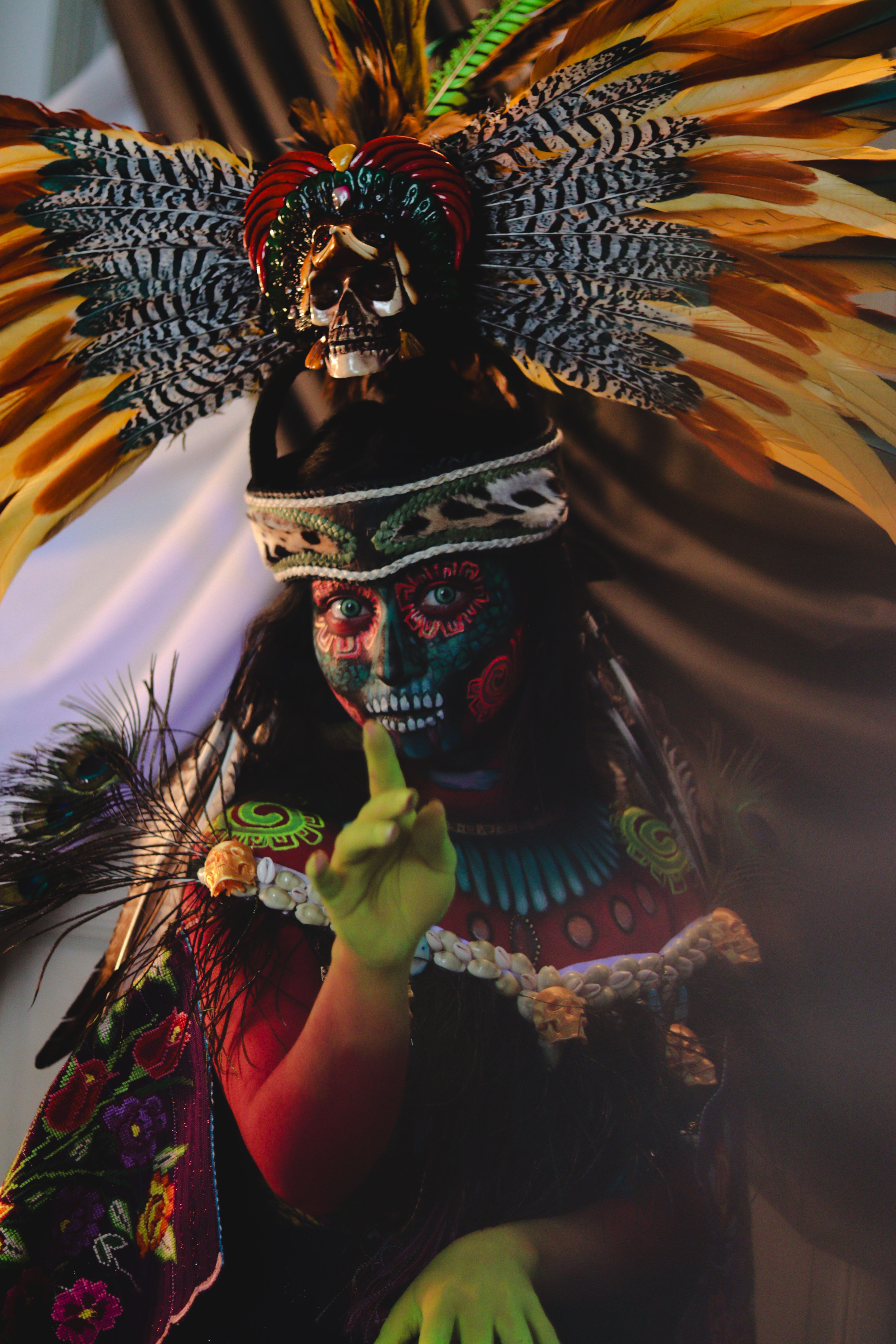 Native Mexican Aztec warrior, with pre-Hispanic makeup simulating a ...
