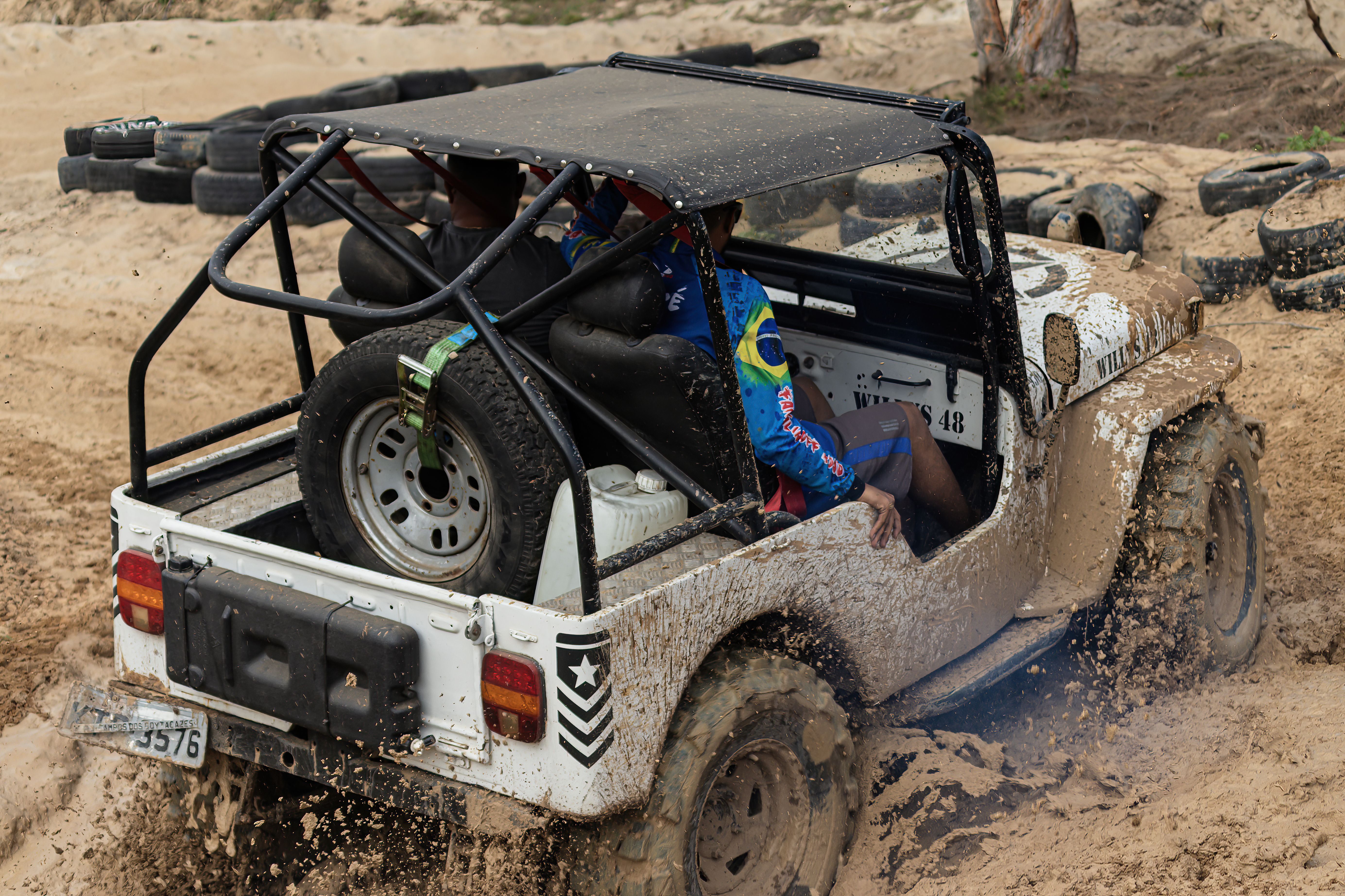 Off-road adventure in muddy terrain · Free Stock Photo