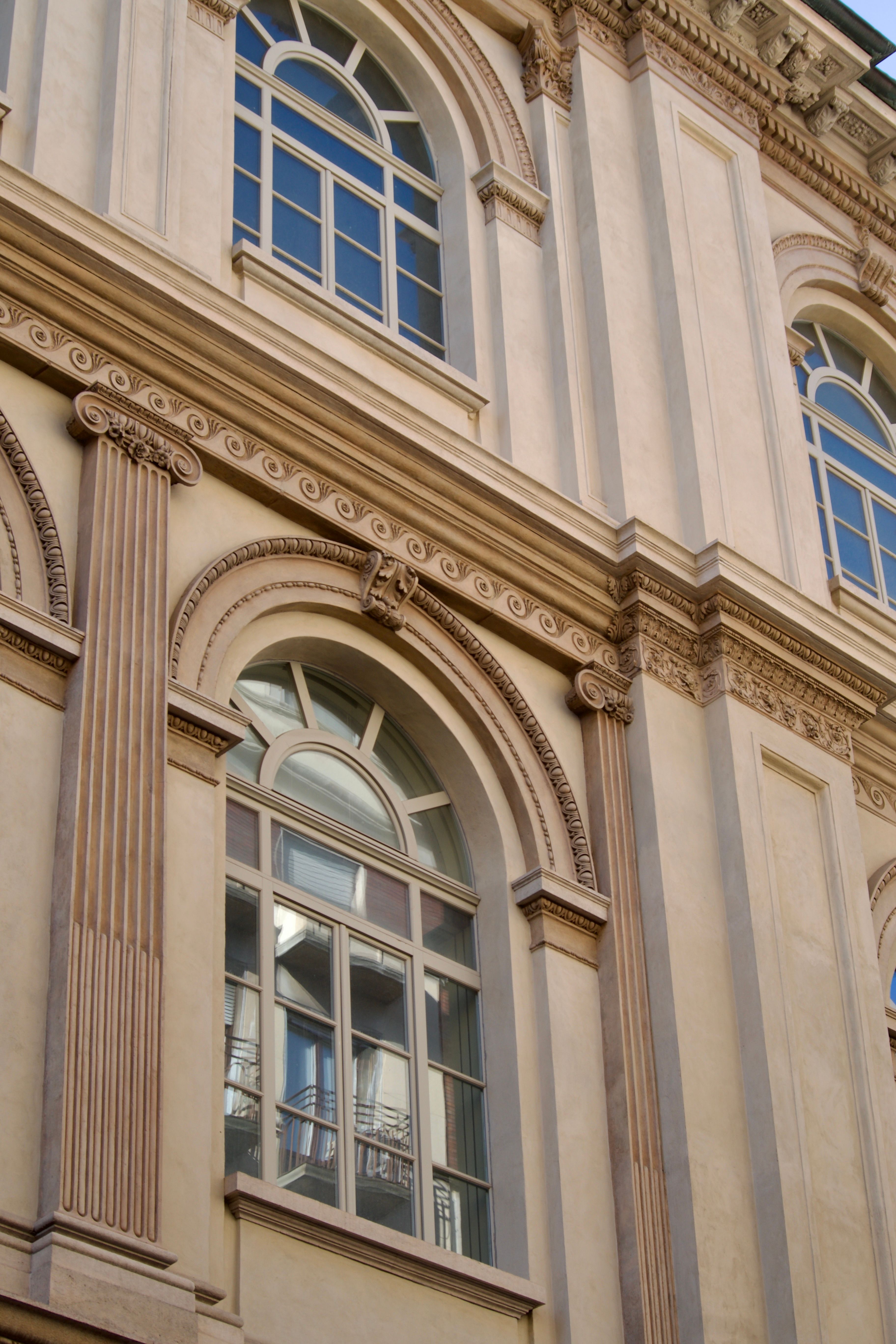 Classic European Architectural Facade with Arched Windows · Free Stock ...