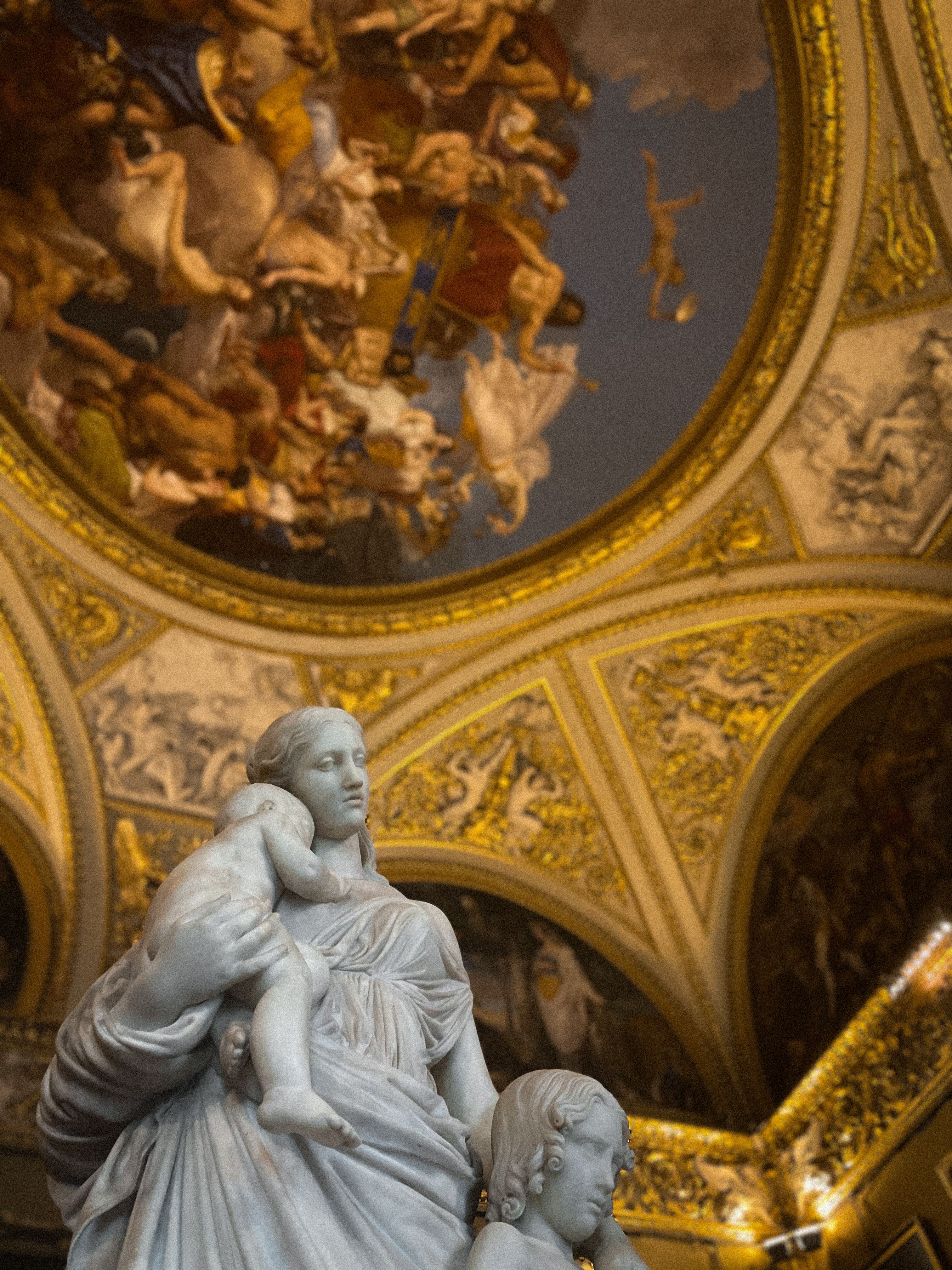 Renaissance Museum Sculpture and Ornate Ceiling · Free Stock Photo
