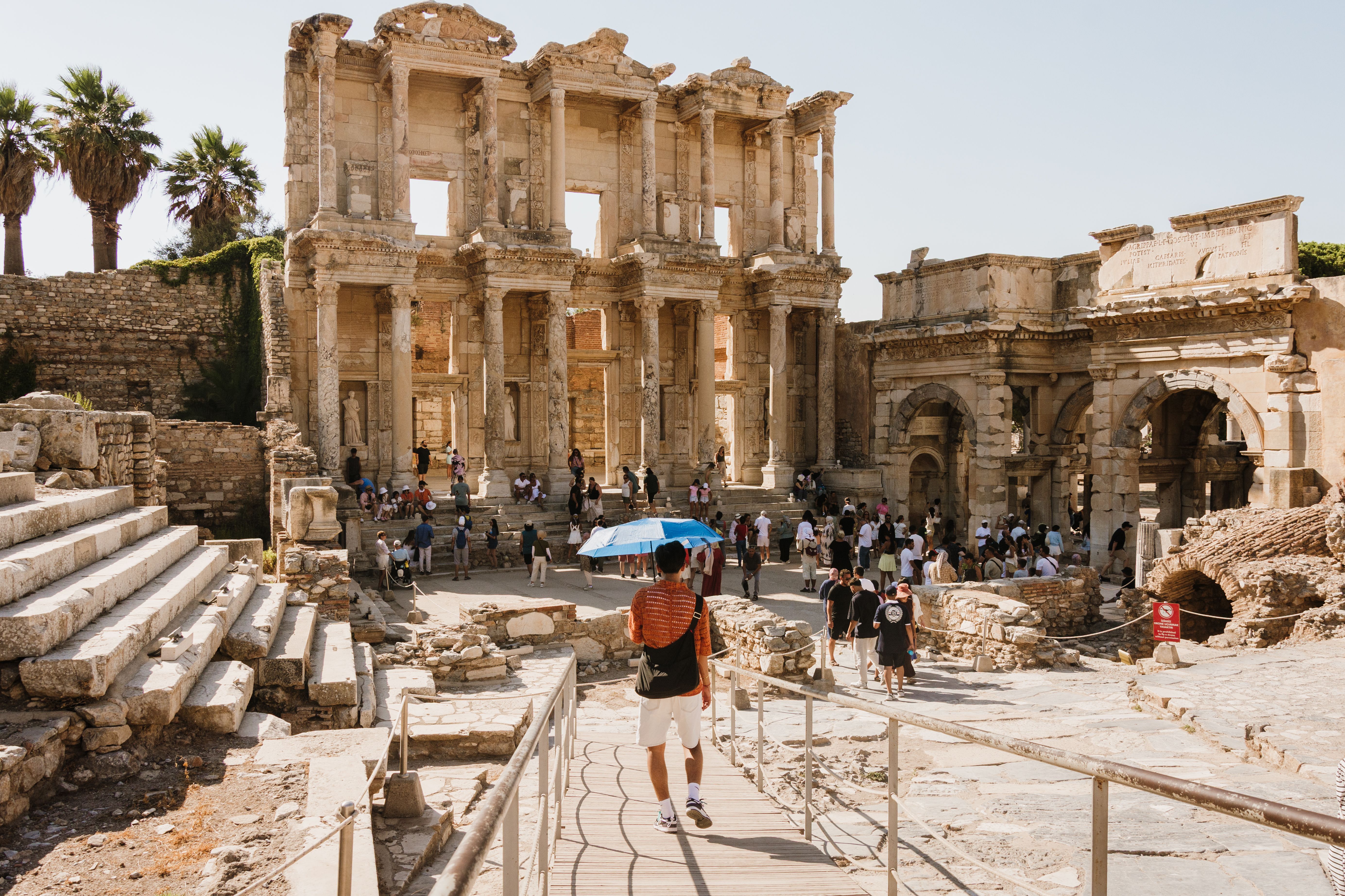 Tourists exploring ancient ruins in Ephesus · Free Stock Photo