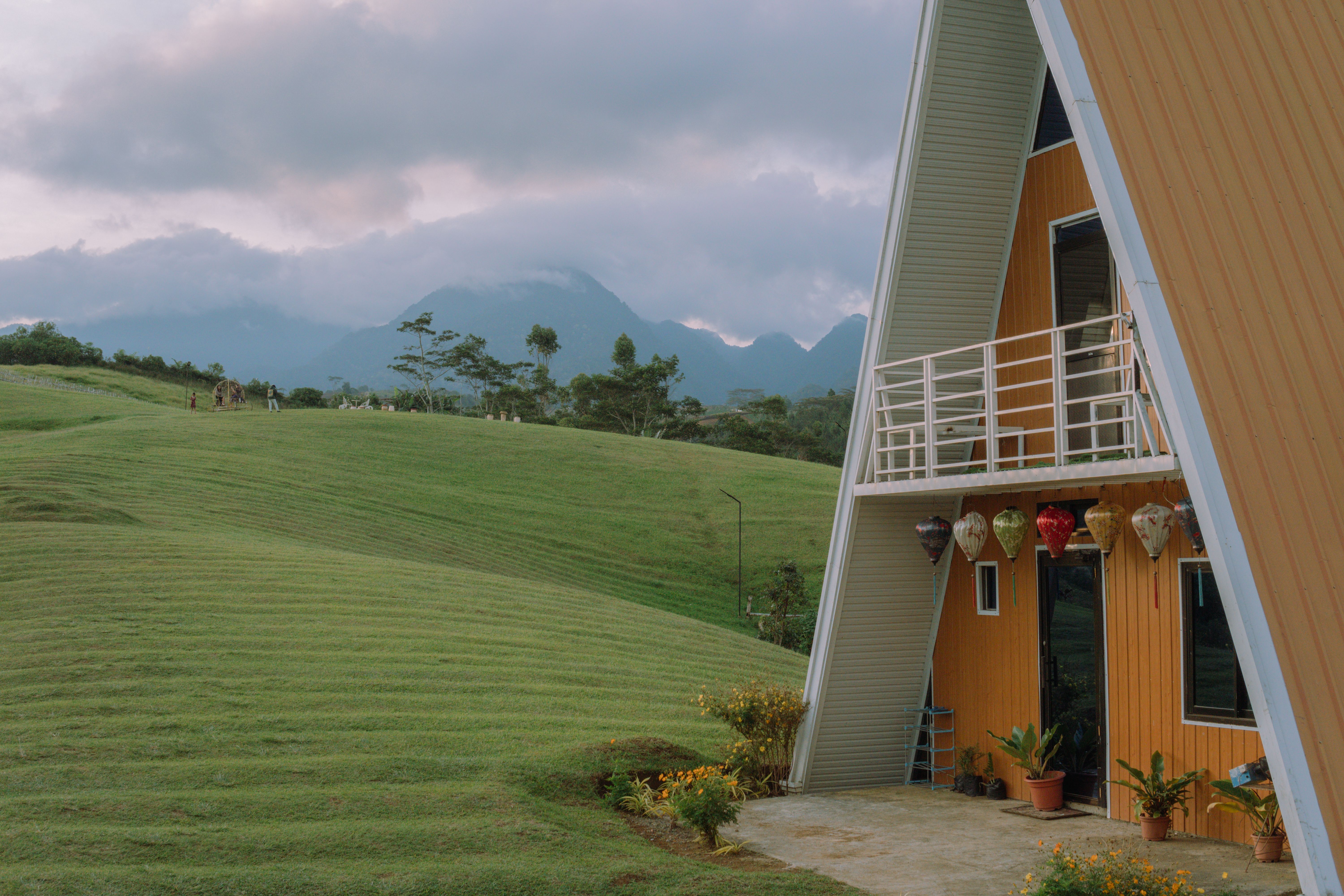 A-Frame House on Scenic Hillside · Free Stock Photo