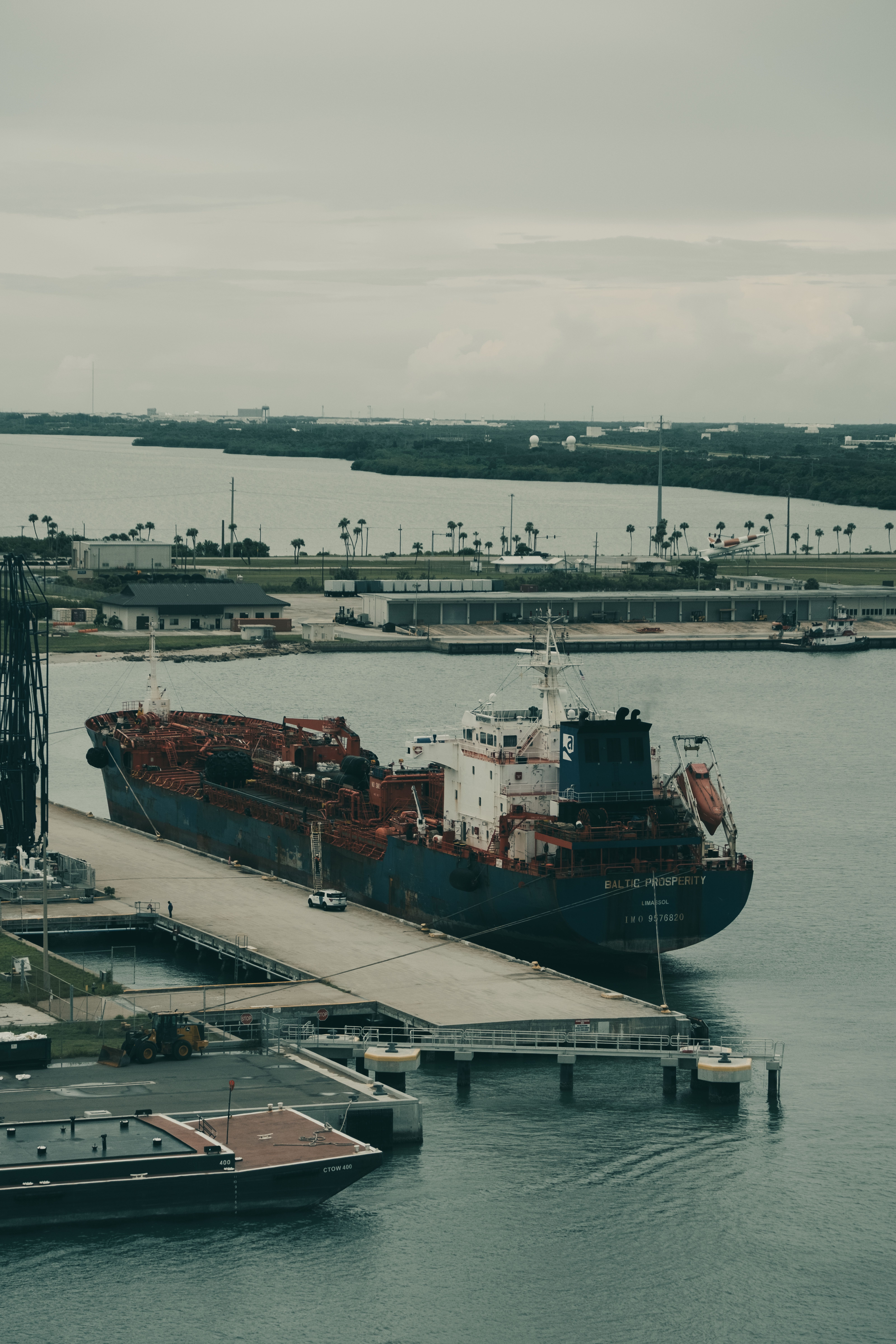 Large Cargo Ship Docked at Cape Canaveral Harbor · Free Stock Photo