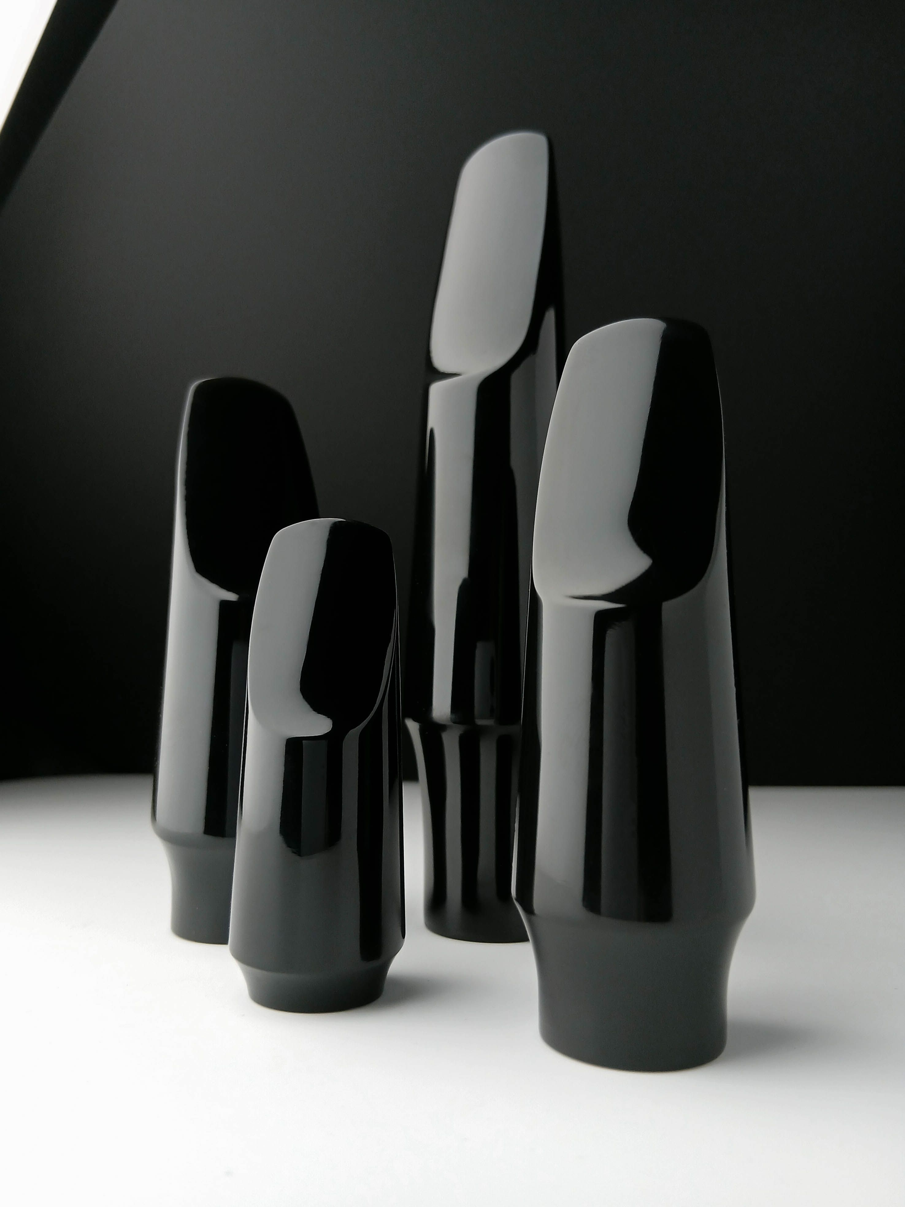 Elegant Black Ceramic Sculptures Display · Free Stock Photo