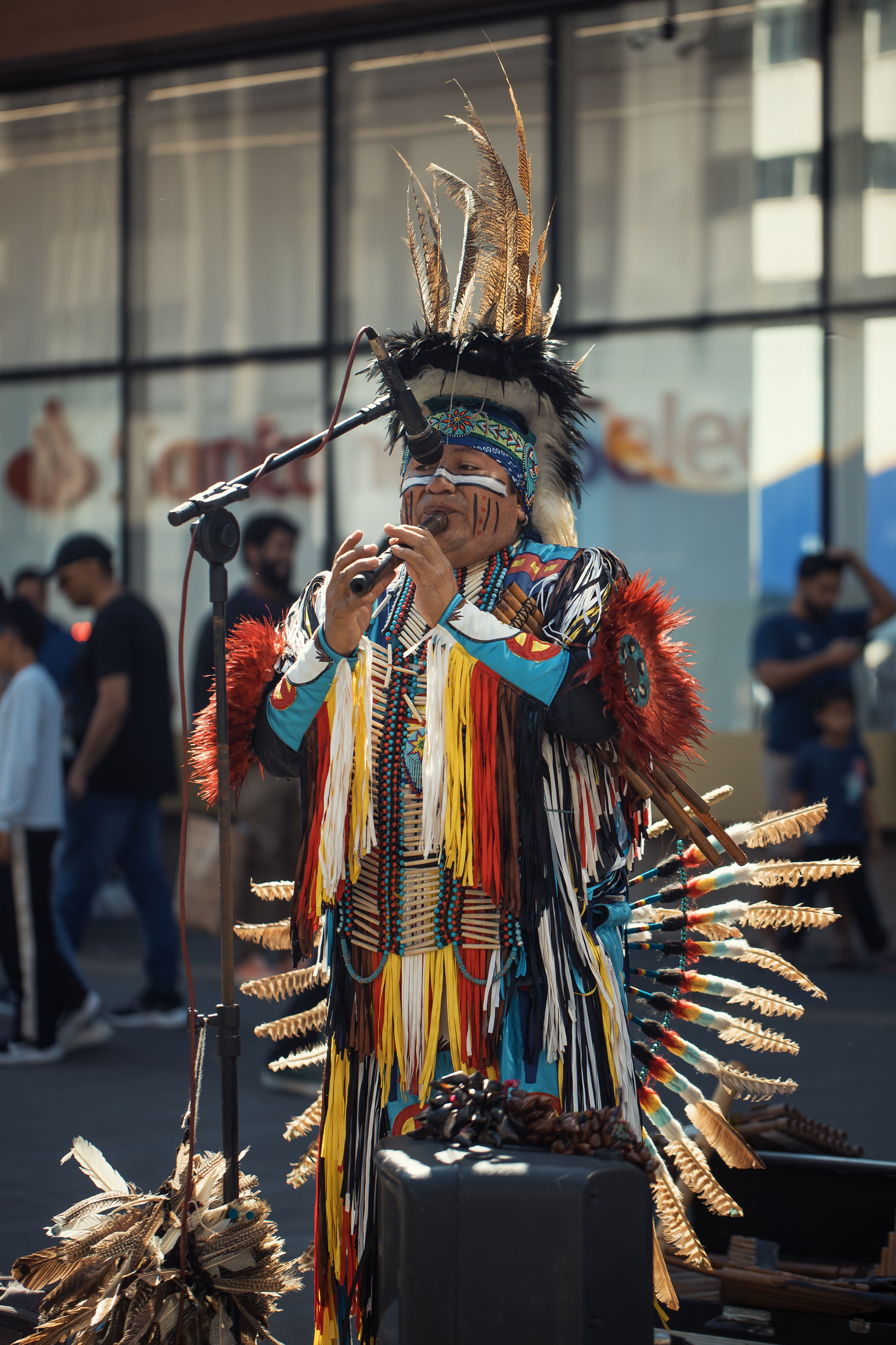 Street Performer in Traditional Indigenous Attire · Free Stock Photo