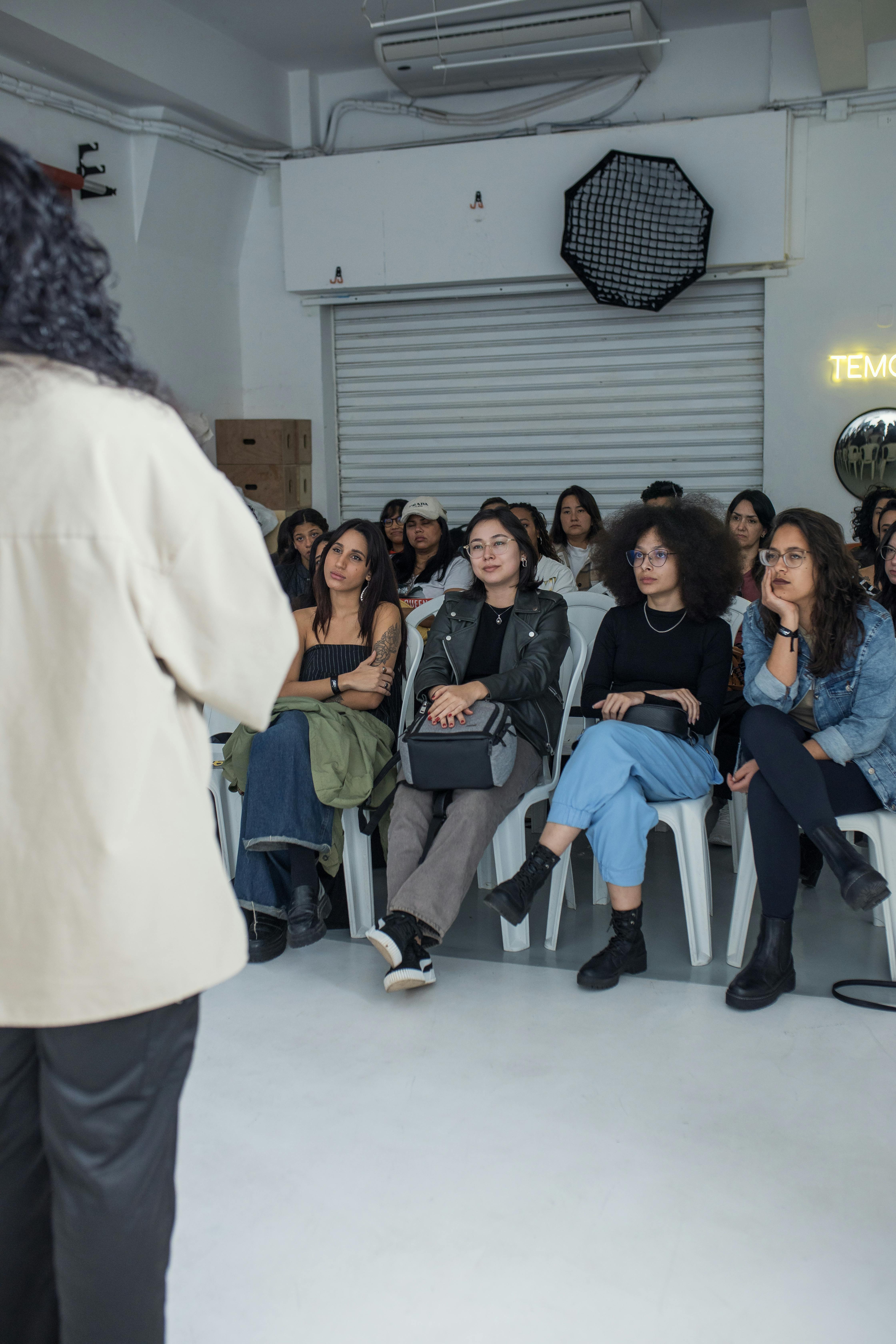 Diverse Audience Attending Indoor Lecture · Free Stock Photo