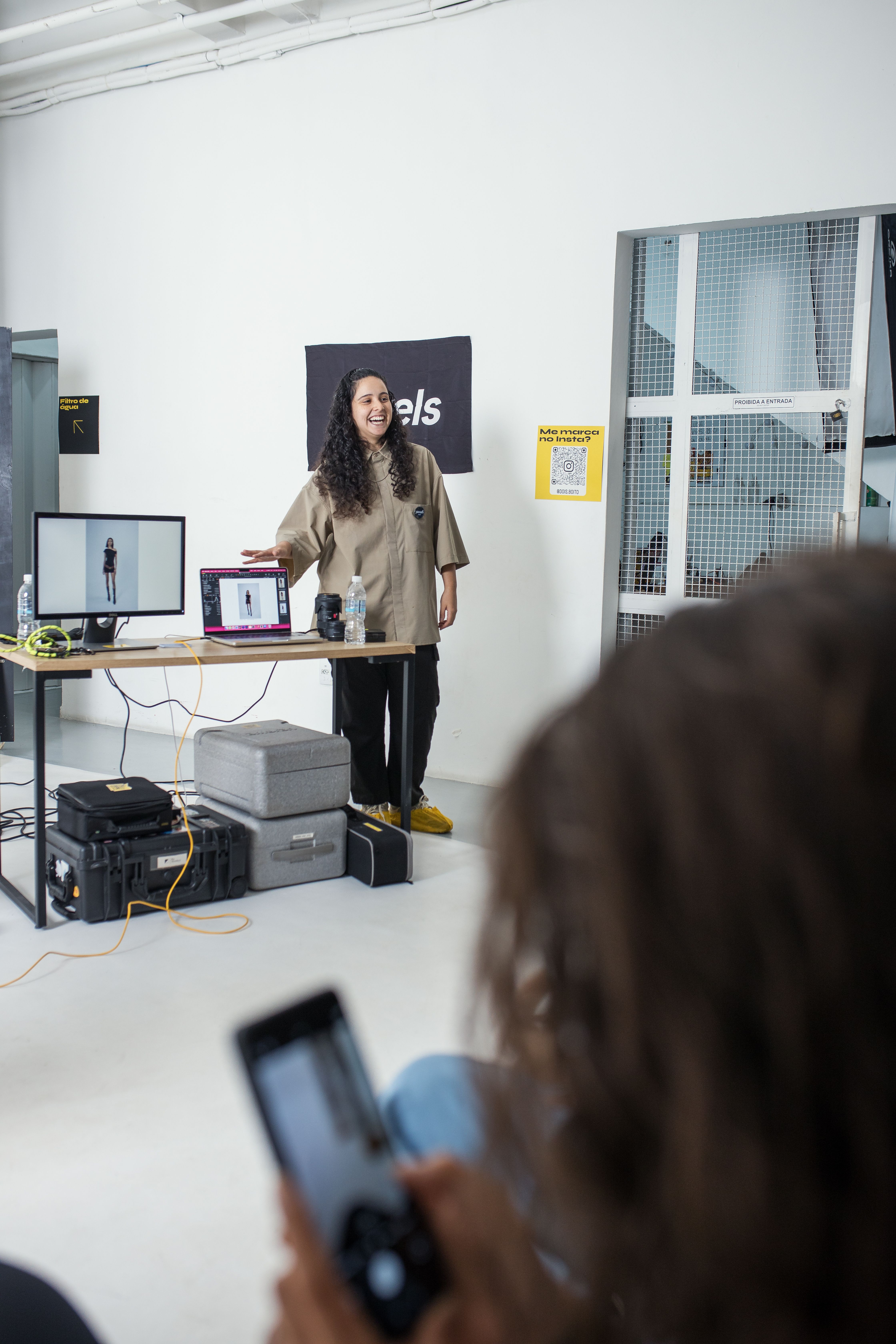 Woman Presenting in Modern Office Setting · Free Stock Photo