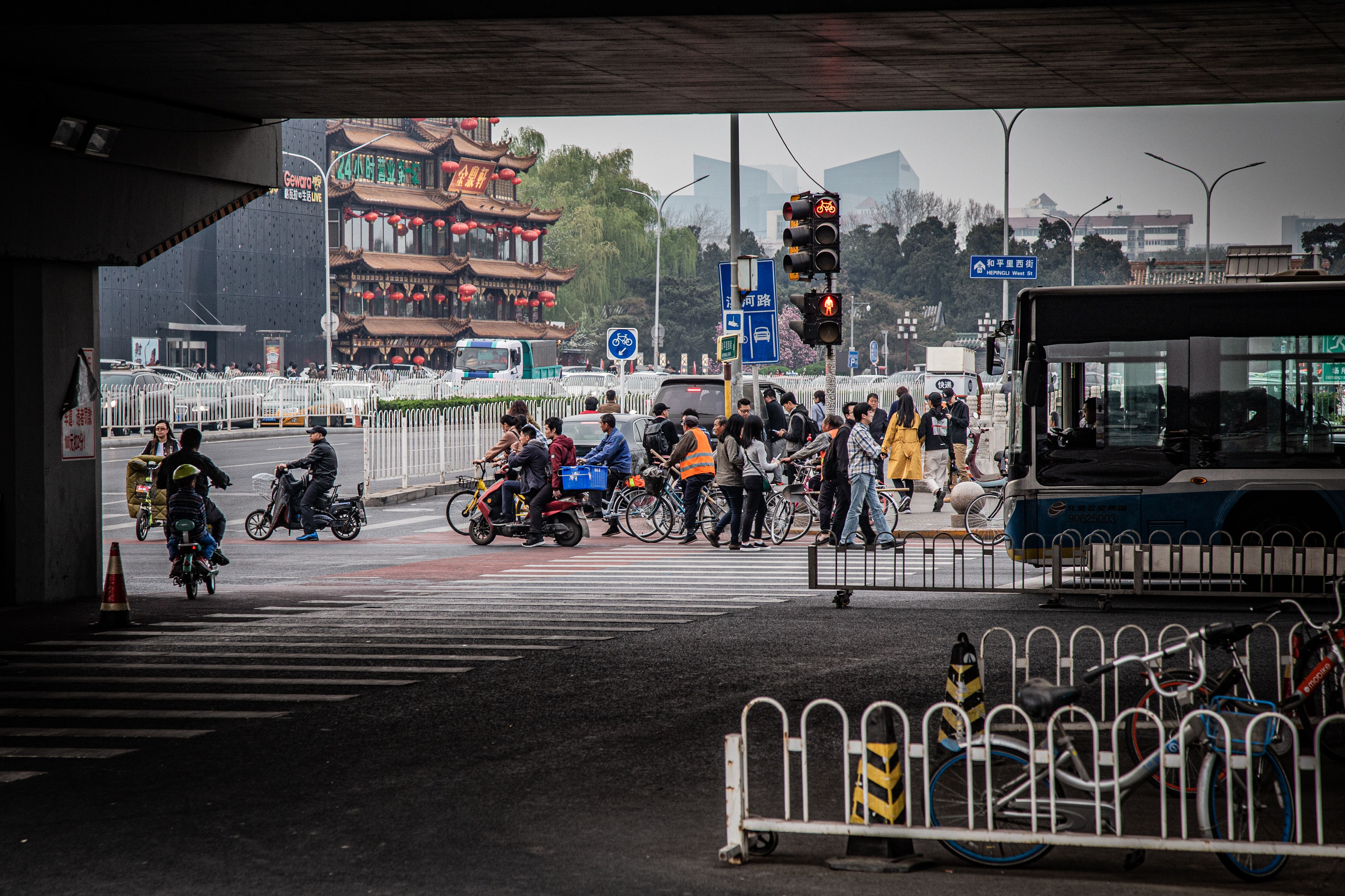 Urban Street Scene with Cyclists in Beijing · Free Stock Photo