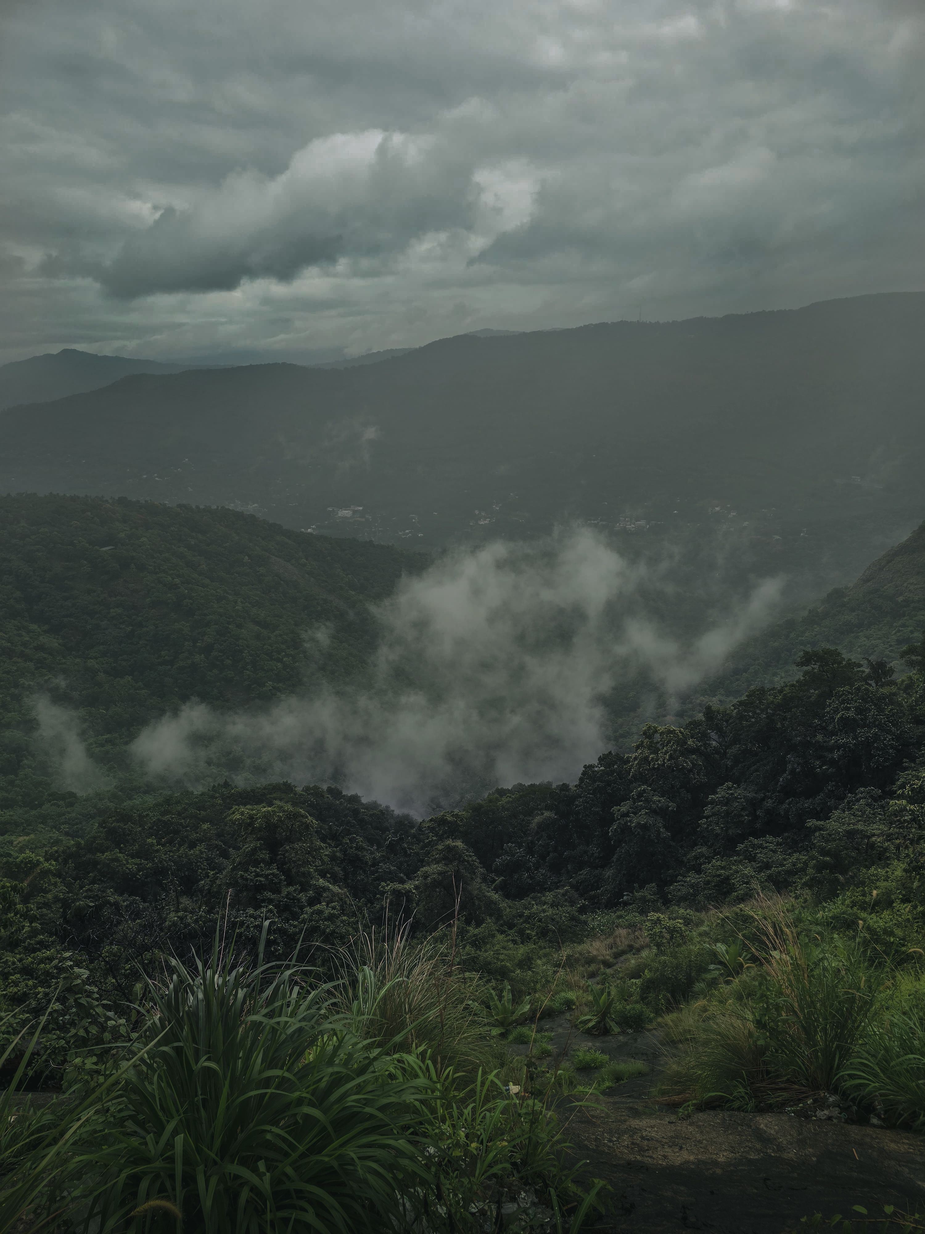 Misty Swiss Valley Landscape in Dramatic Weather · Free Stock Photo