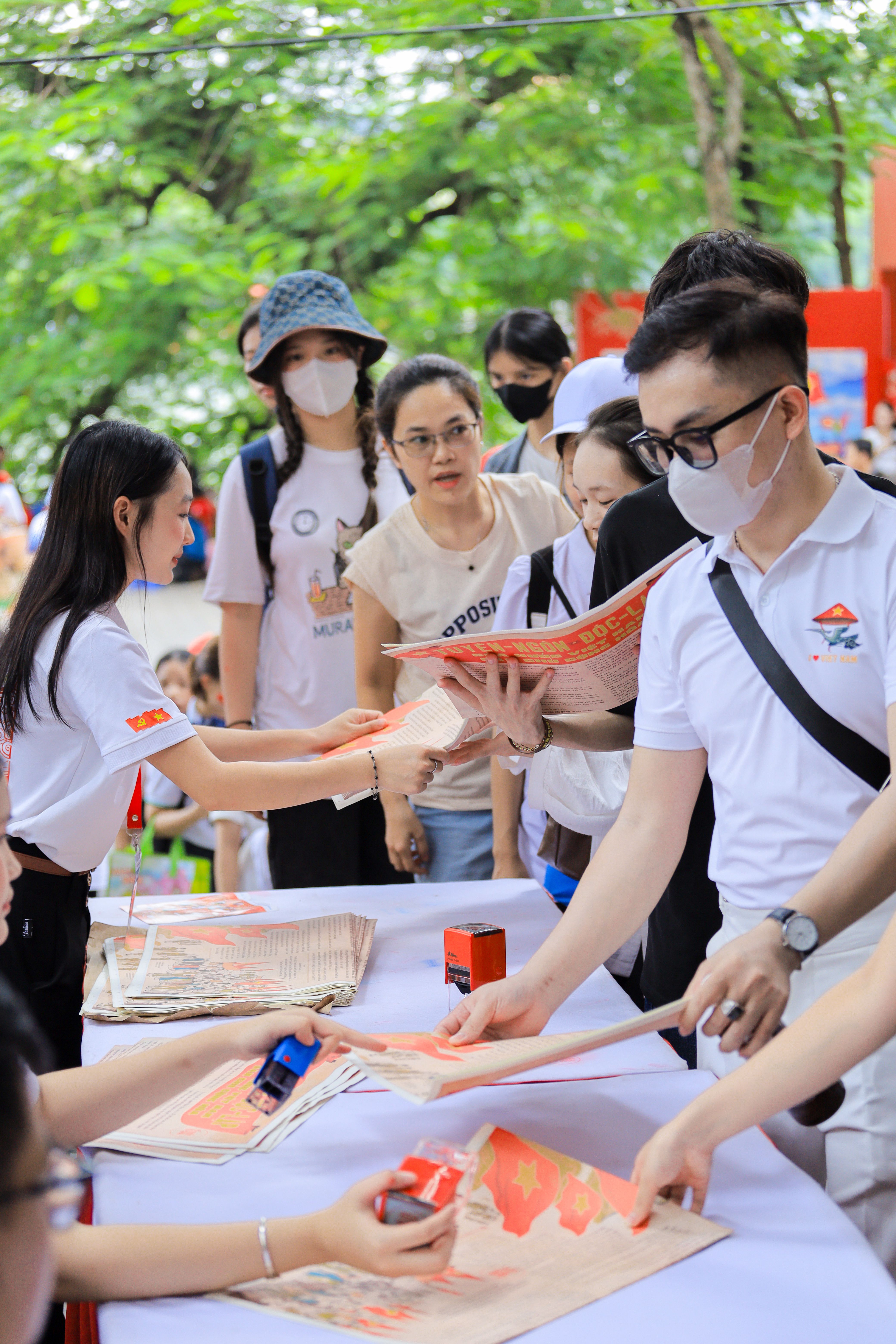 Community Event with Paper Handouts in Hà Nội · Free Stock Photo