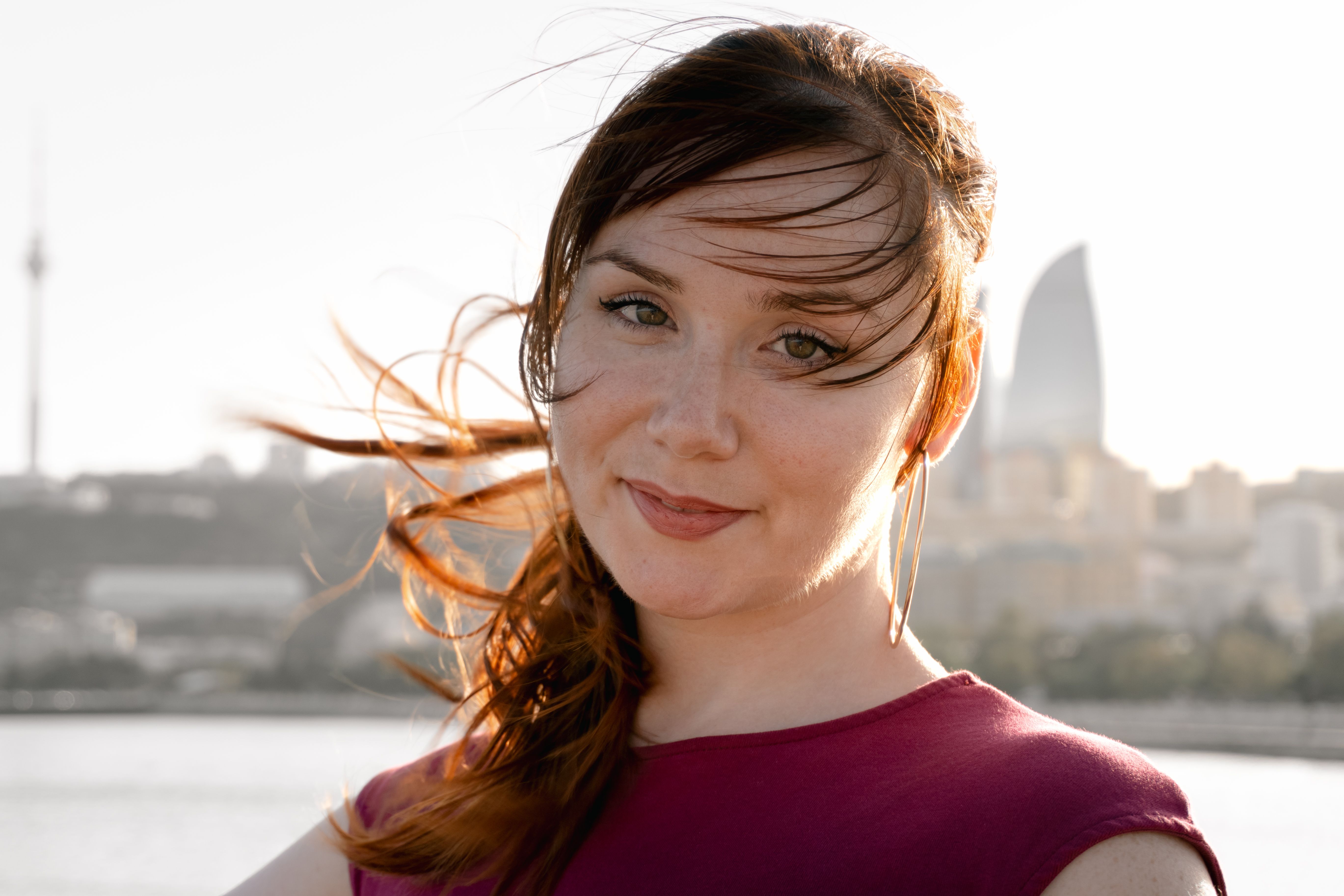 Portrait of Woman with Baku Skyline Background · Free Stock Photo
