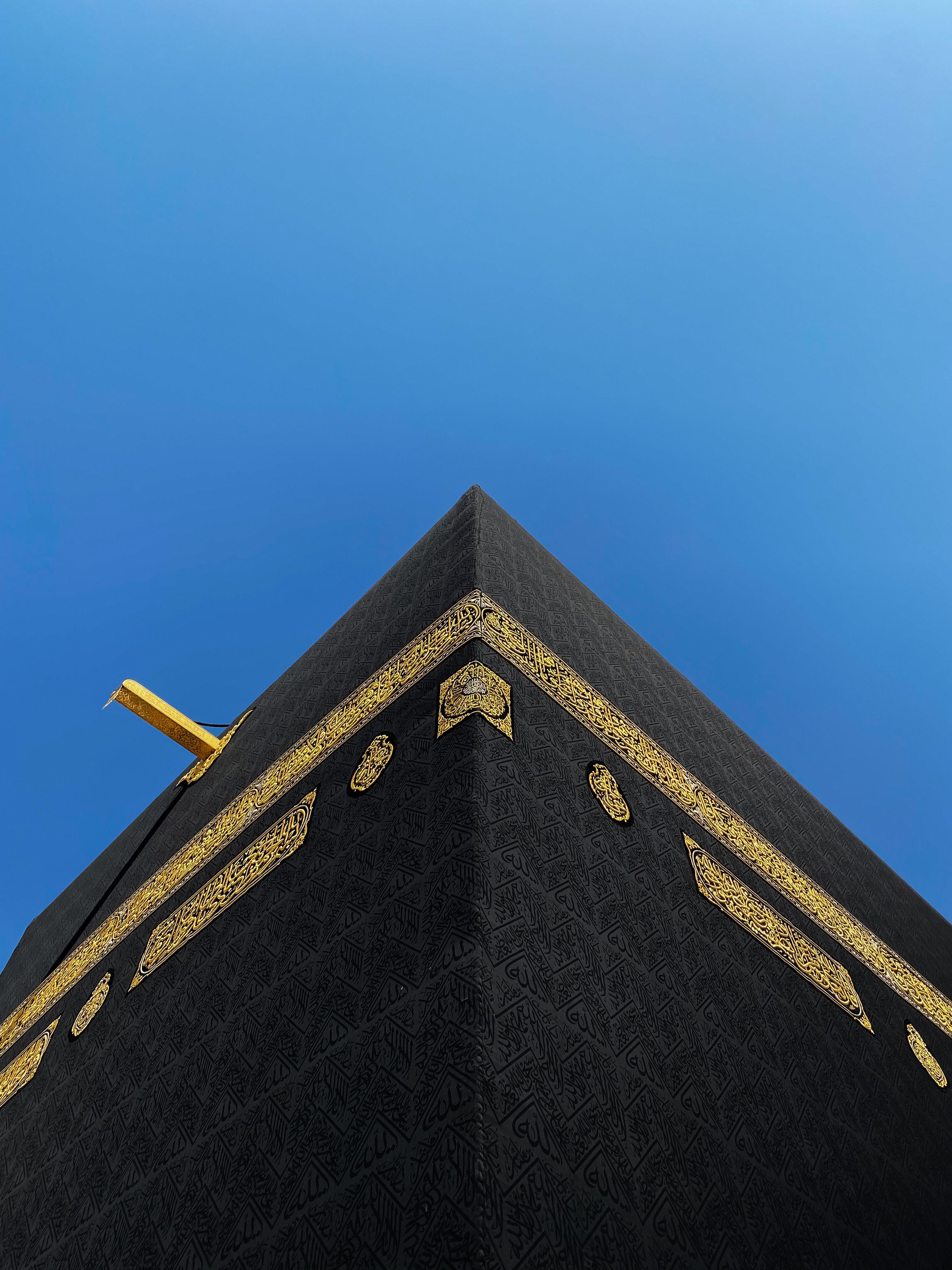 Kaaba Corner View Against Clear Blue Sky · Free Stock Photo