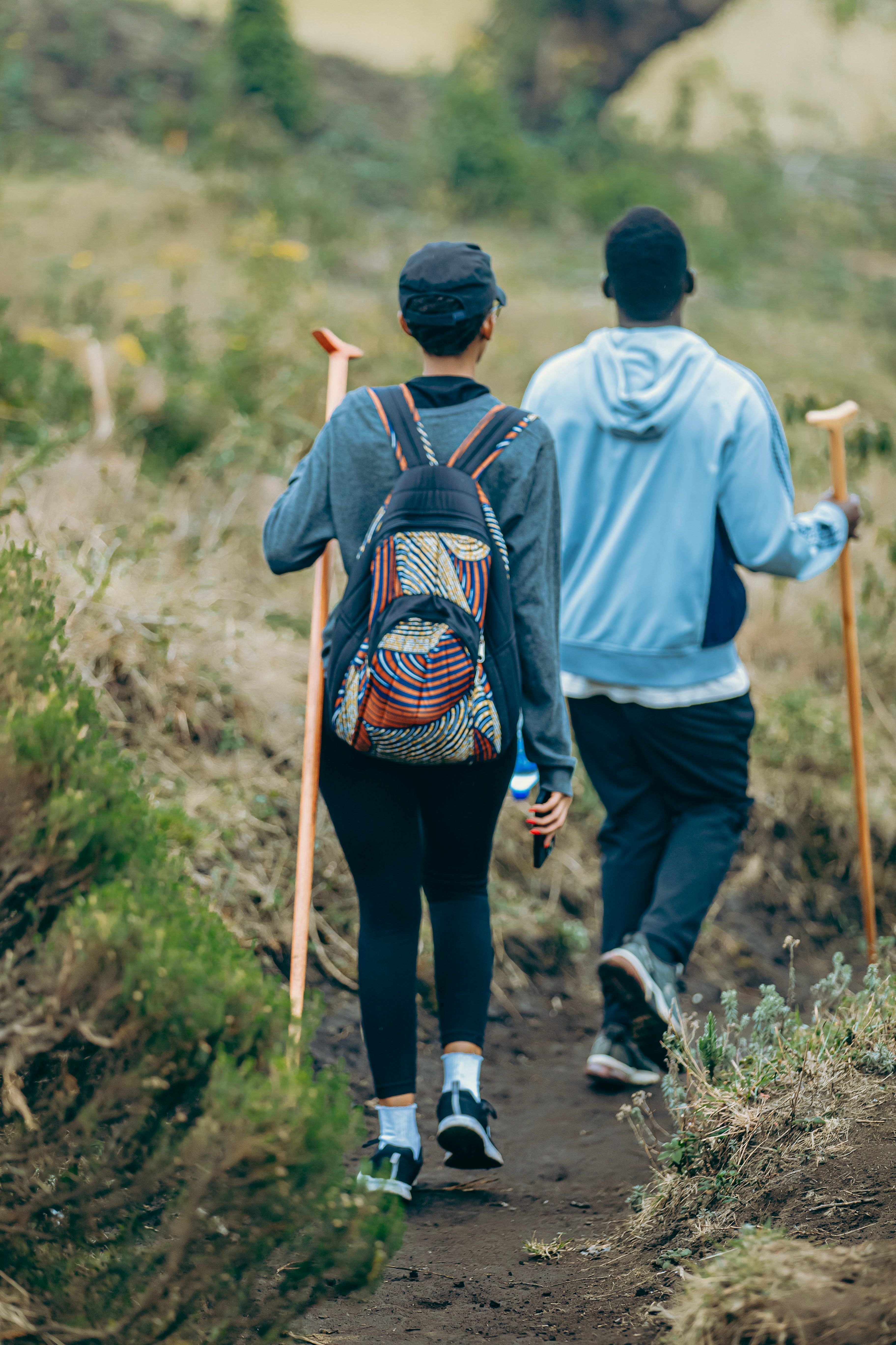 Two People Hiking on a Scenic Trail · Free Stock Photo