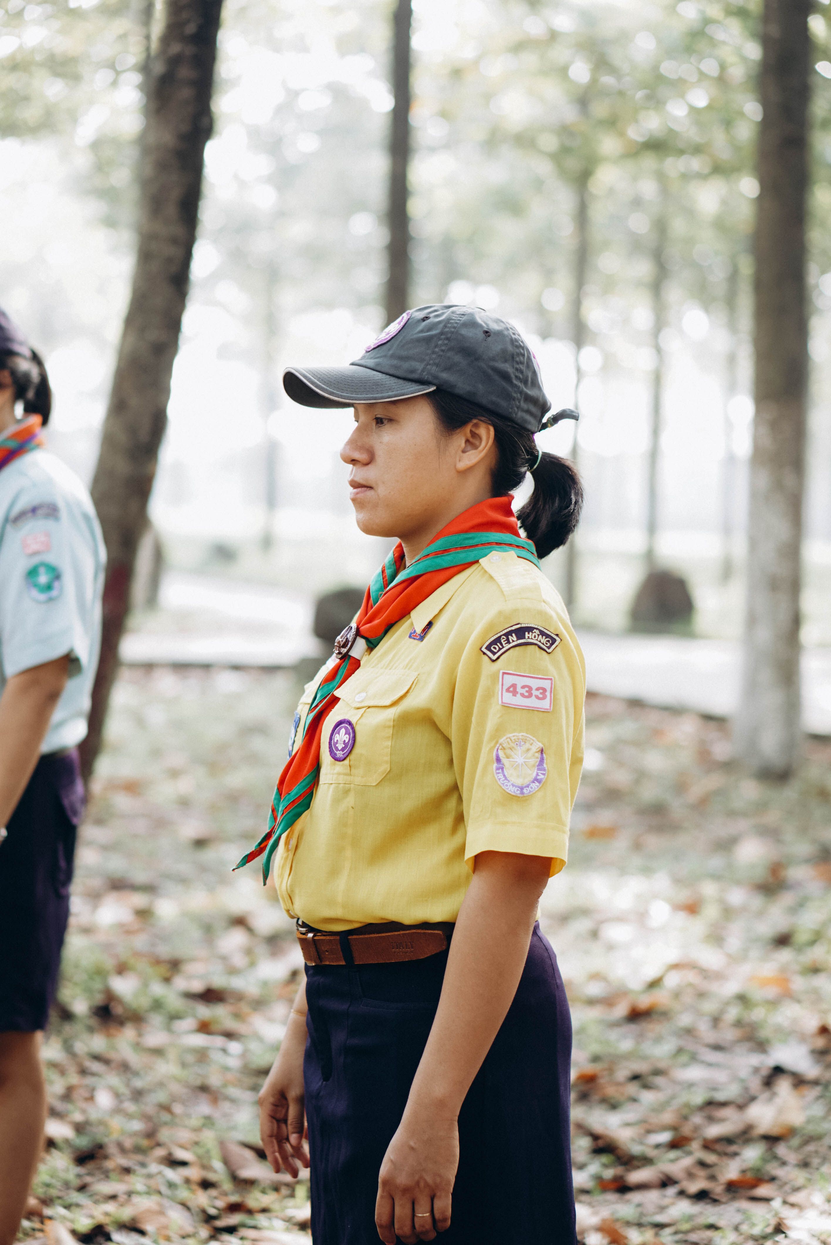 Scout Leader in Uniform at Outdoor Gathering · Free Stock Photo