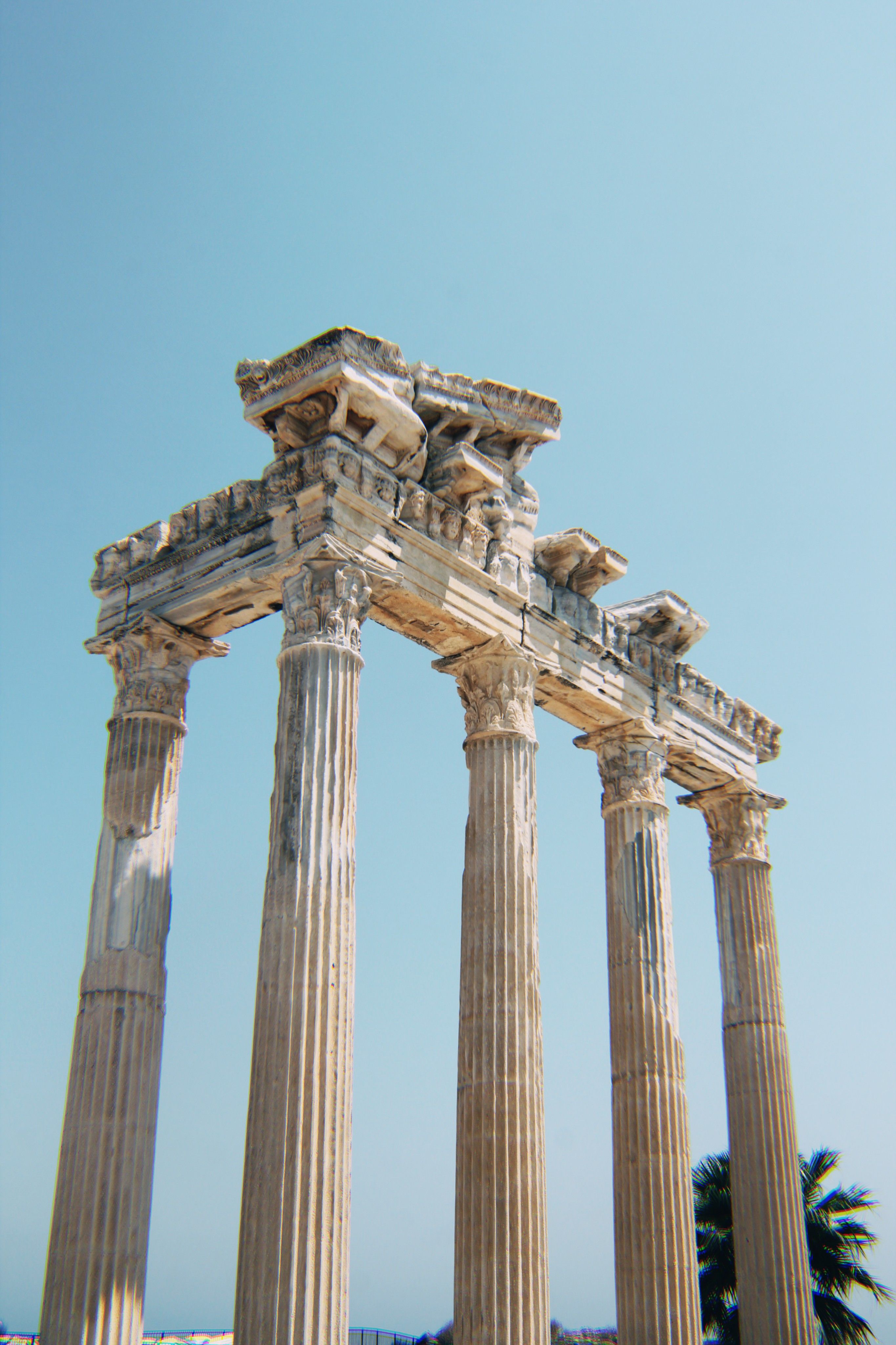 Ancient Greek Temple Ruins Under Clear Sky · Free Stock Photo