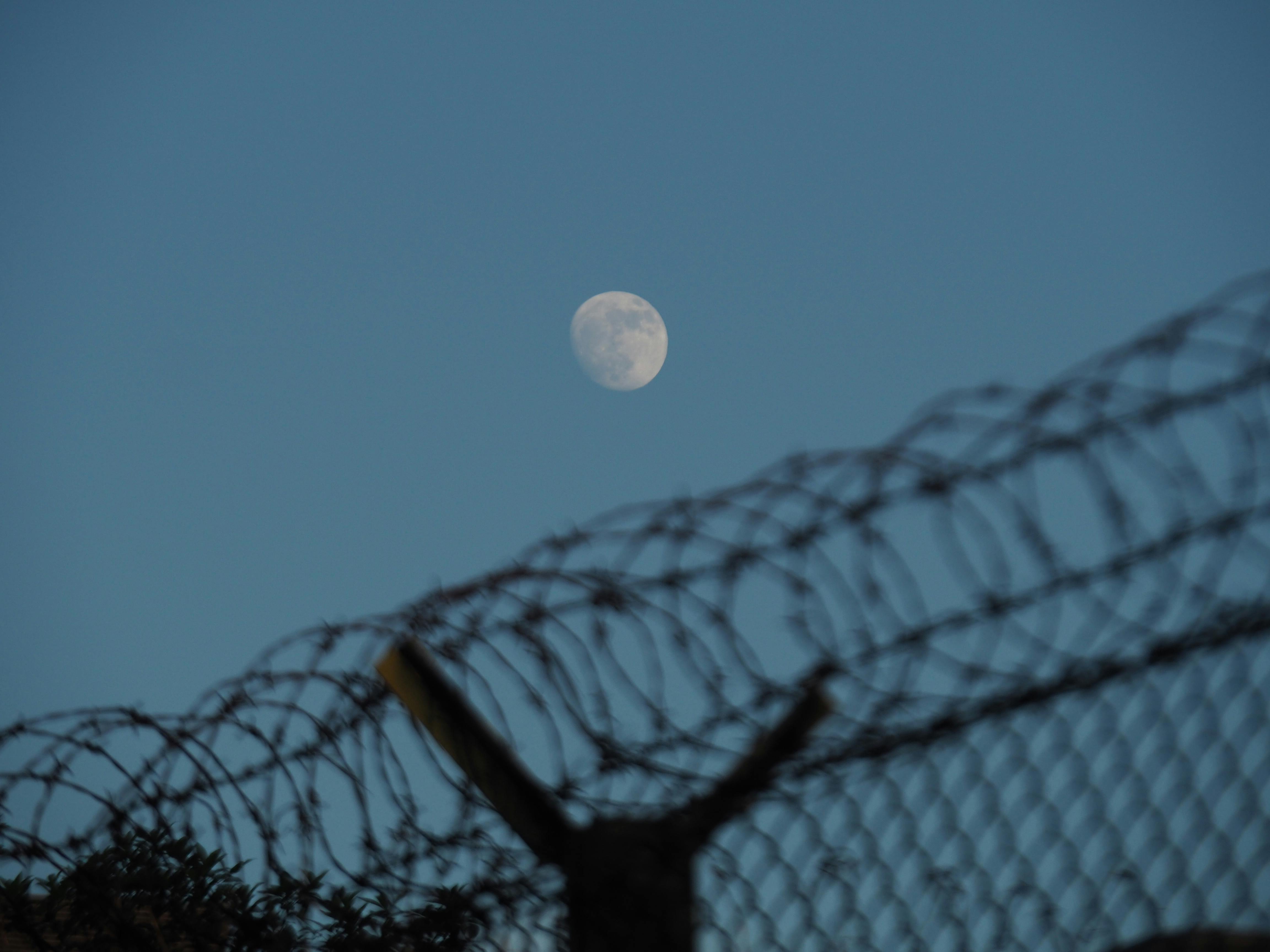 Moon Over Barbed Wire in Hong Kong · Free Stock Photo