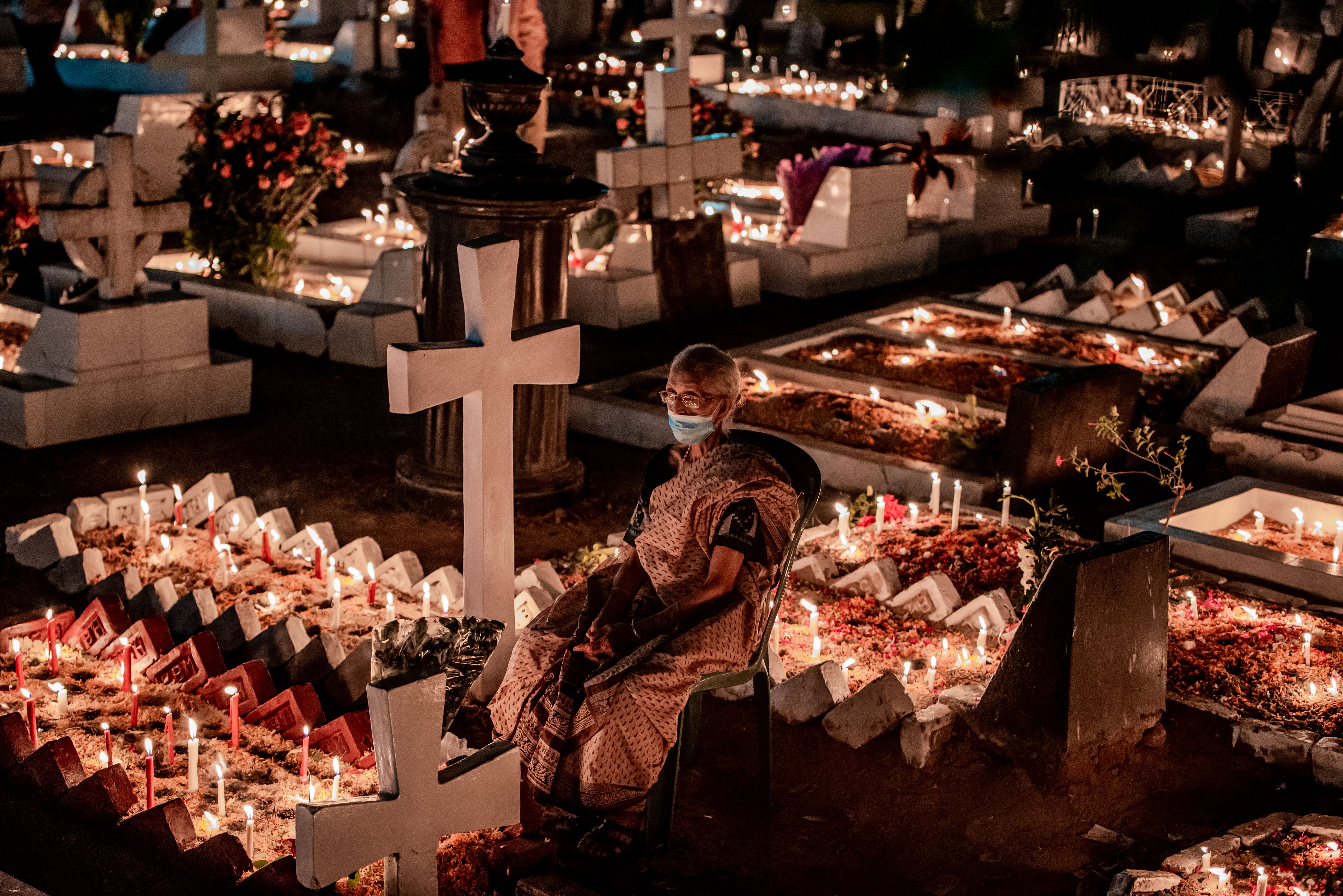 Candlelit Vigil at Night in a Cemetery · Free Stock Photo