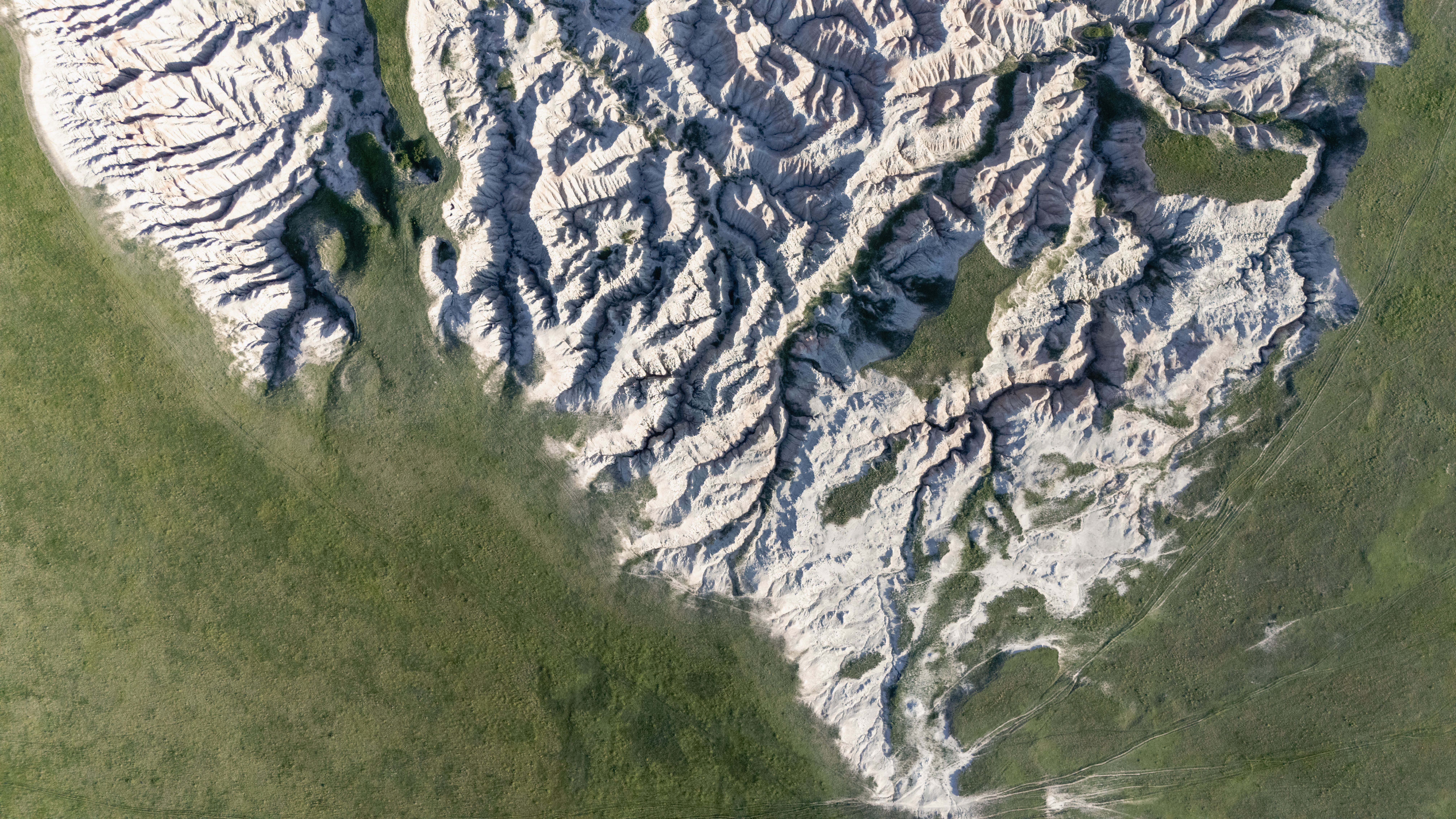 Aerial View of Rugged Badlands Topography · Free Stock Photo