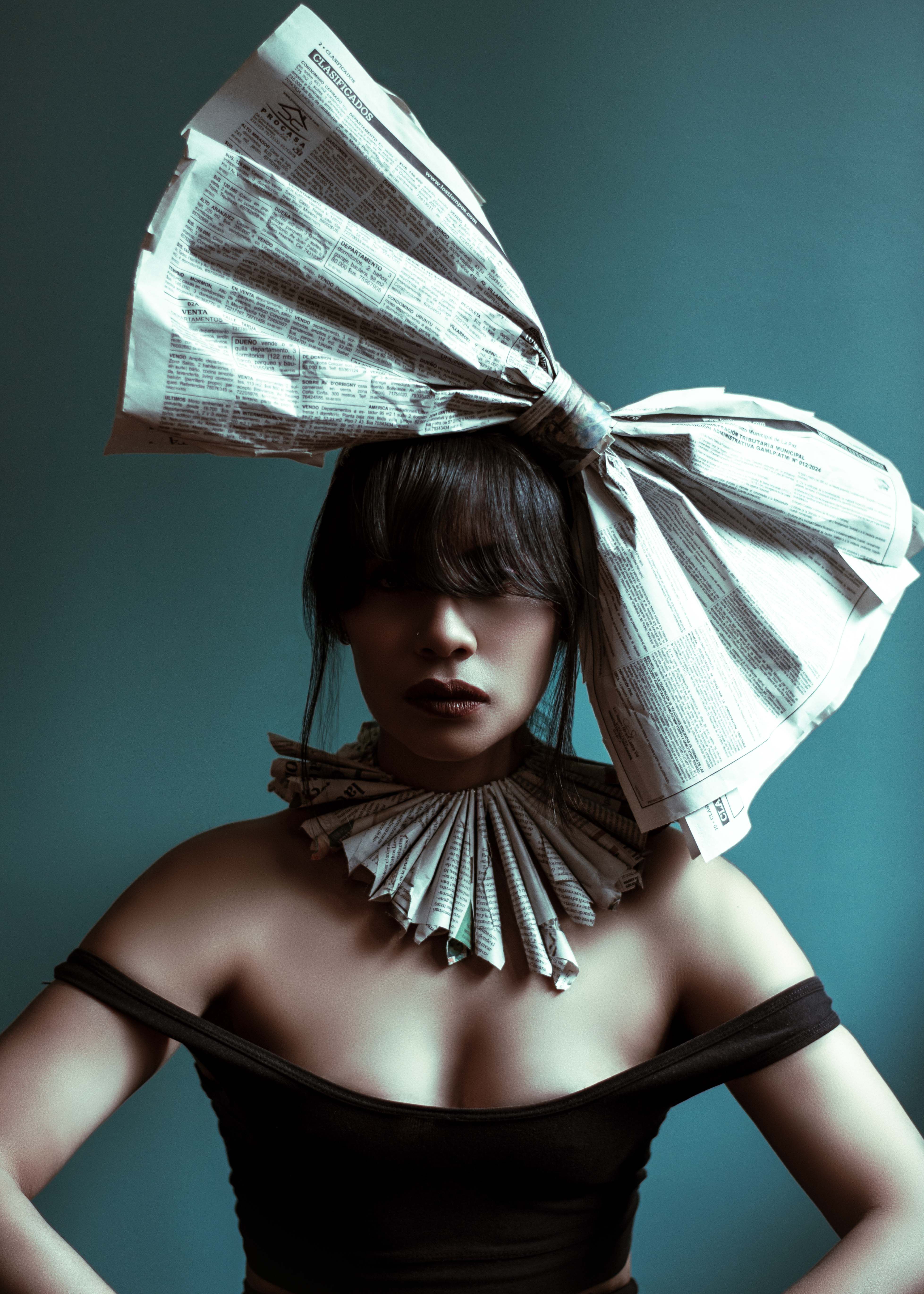 Artistic Portrait with Newspaper Accessories · Free Stock Photo