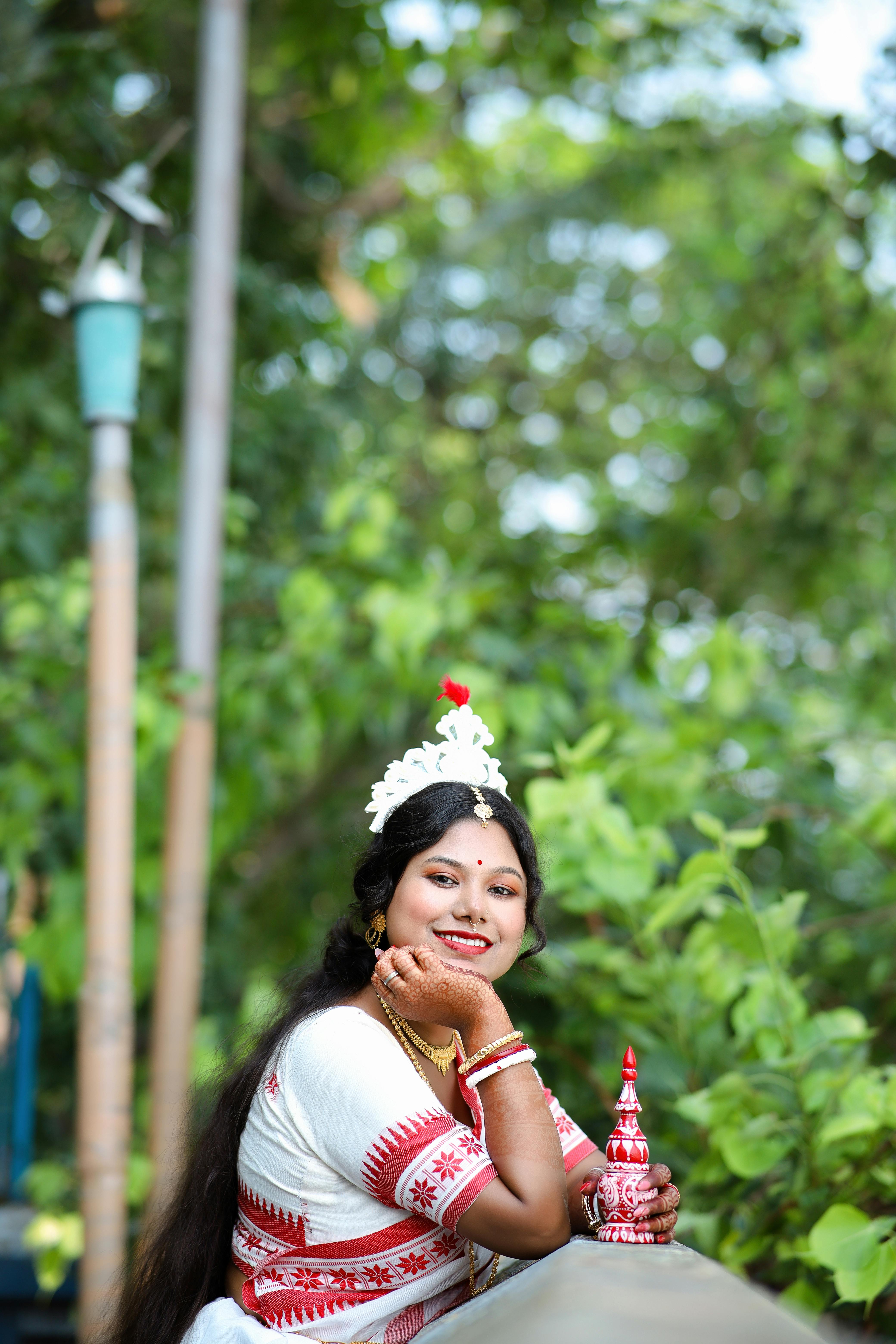 Traditional Assamese Woman in Ethnic Attire Outdoors · Free Stock Photo
