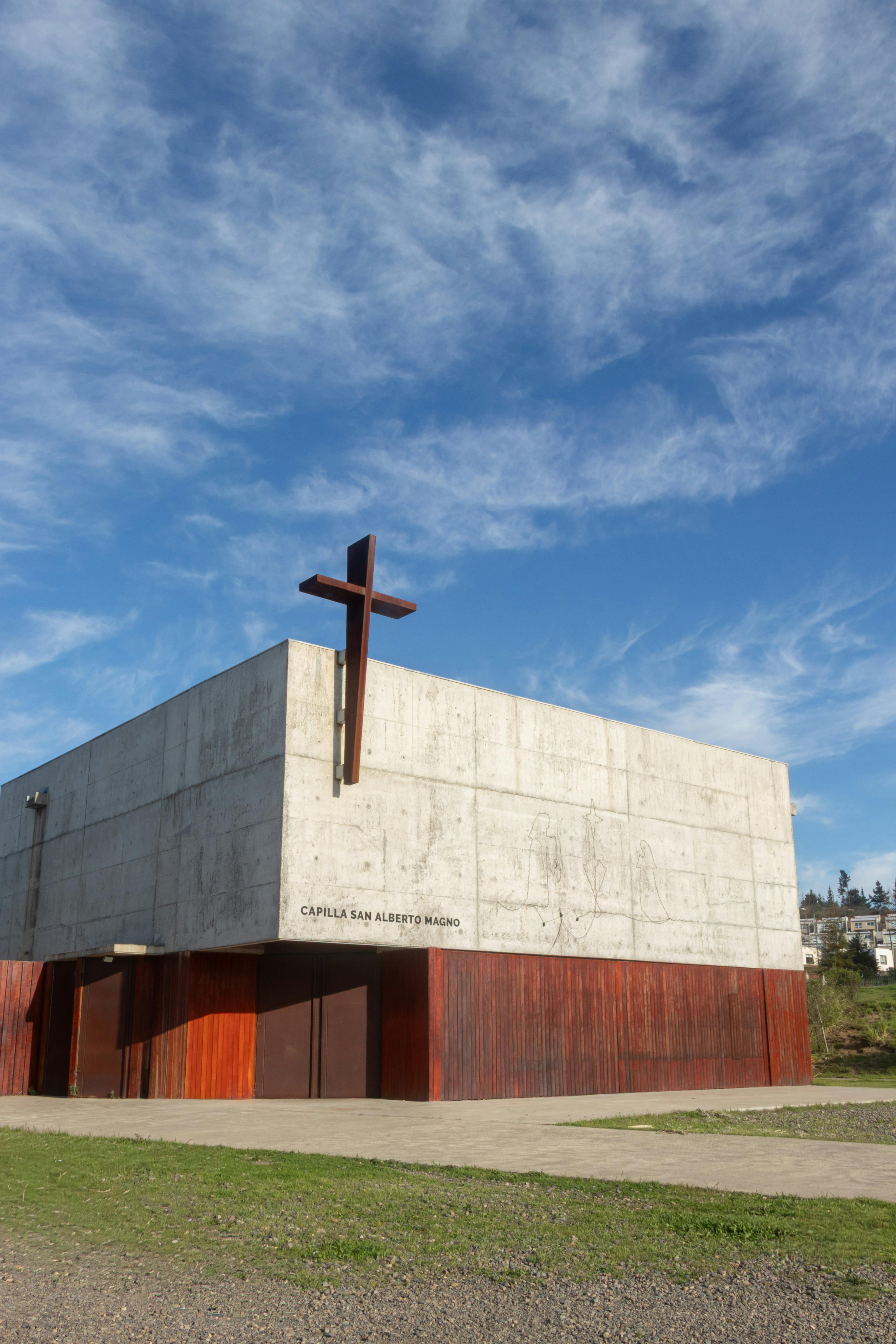 Modern Concrete Church with Prominent Cross · Free Stock Photo