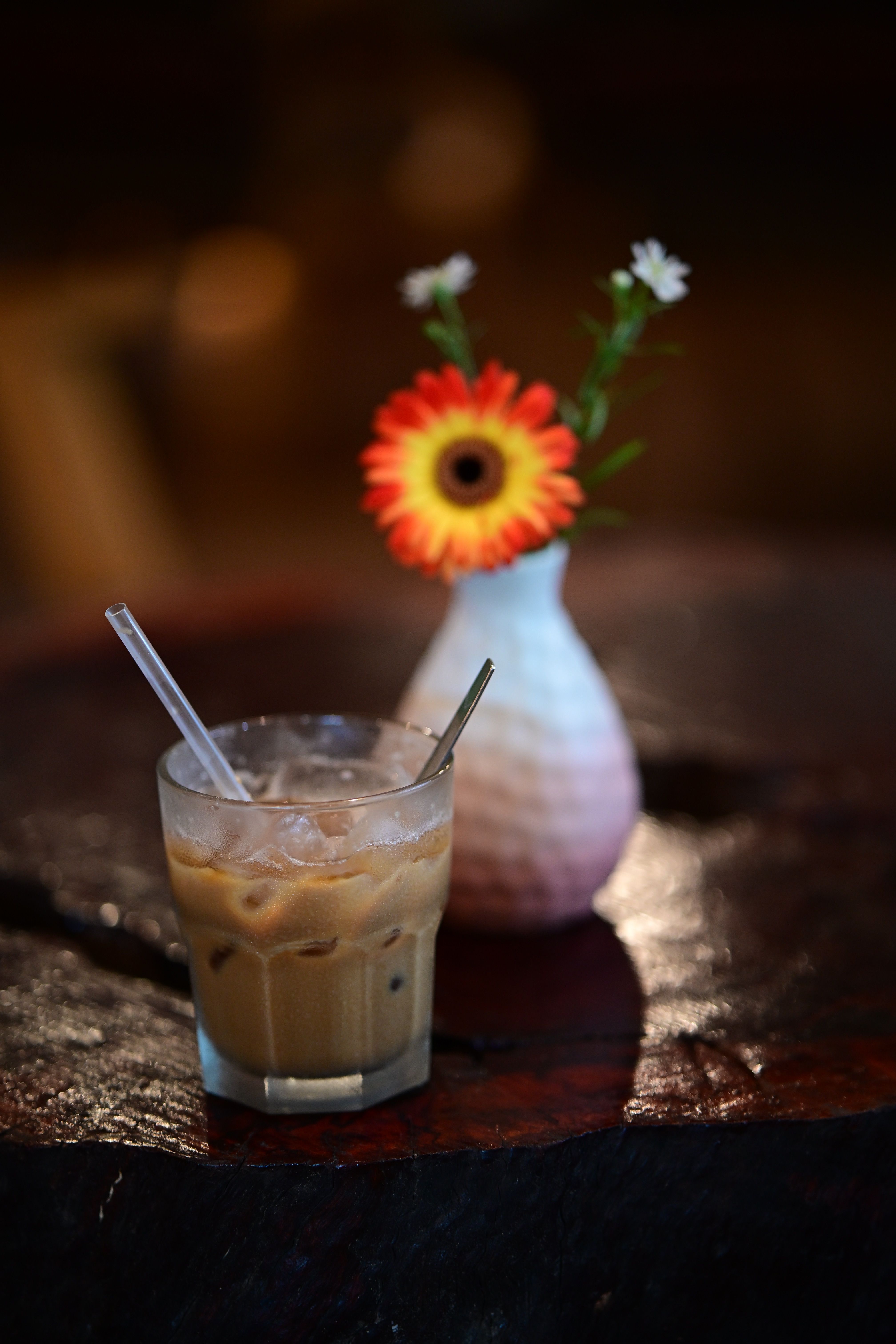 Chilled Iced Coffee with Flower Vase Decor · Free Stock Photo